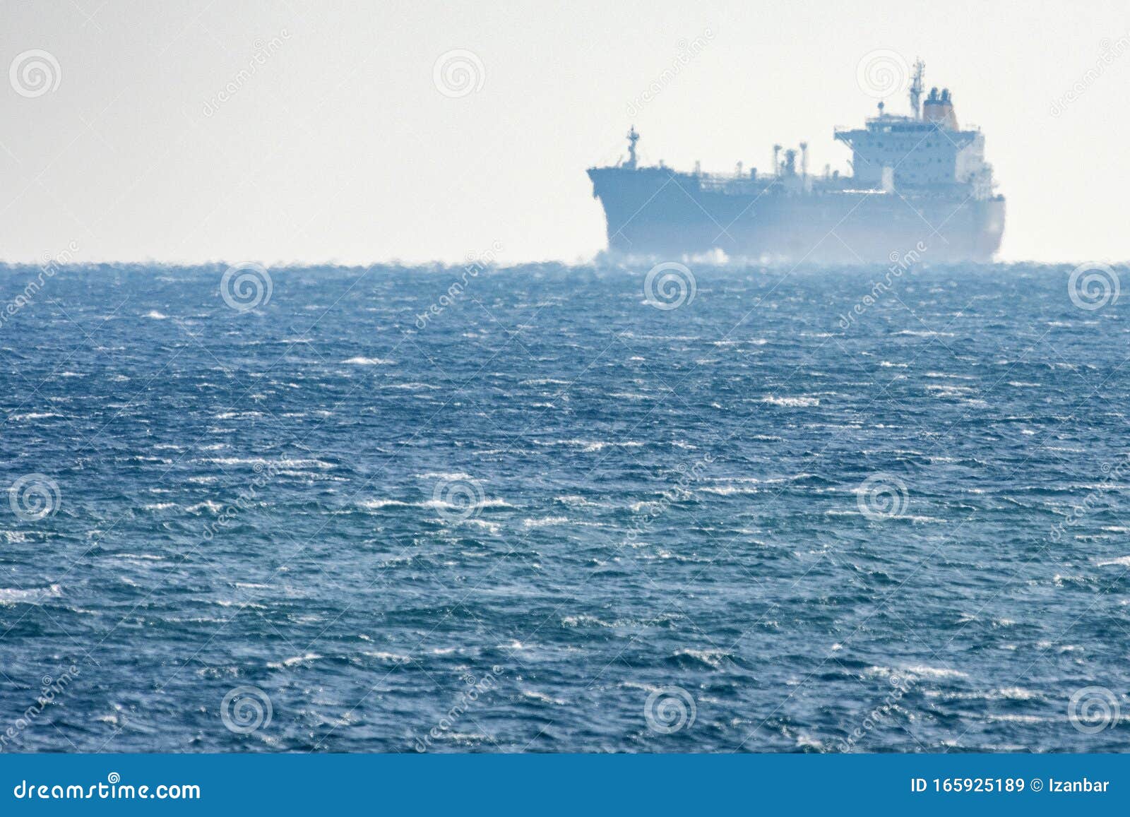 Big Ship Mirage on Sea Horizon Line Stock Image - Image of golden ...