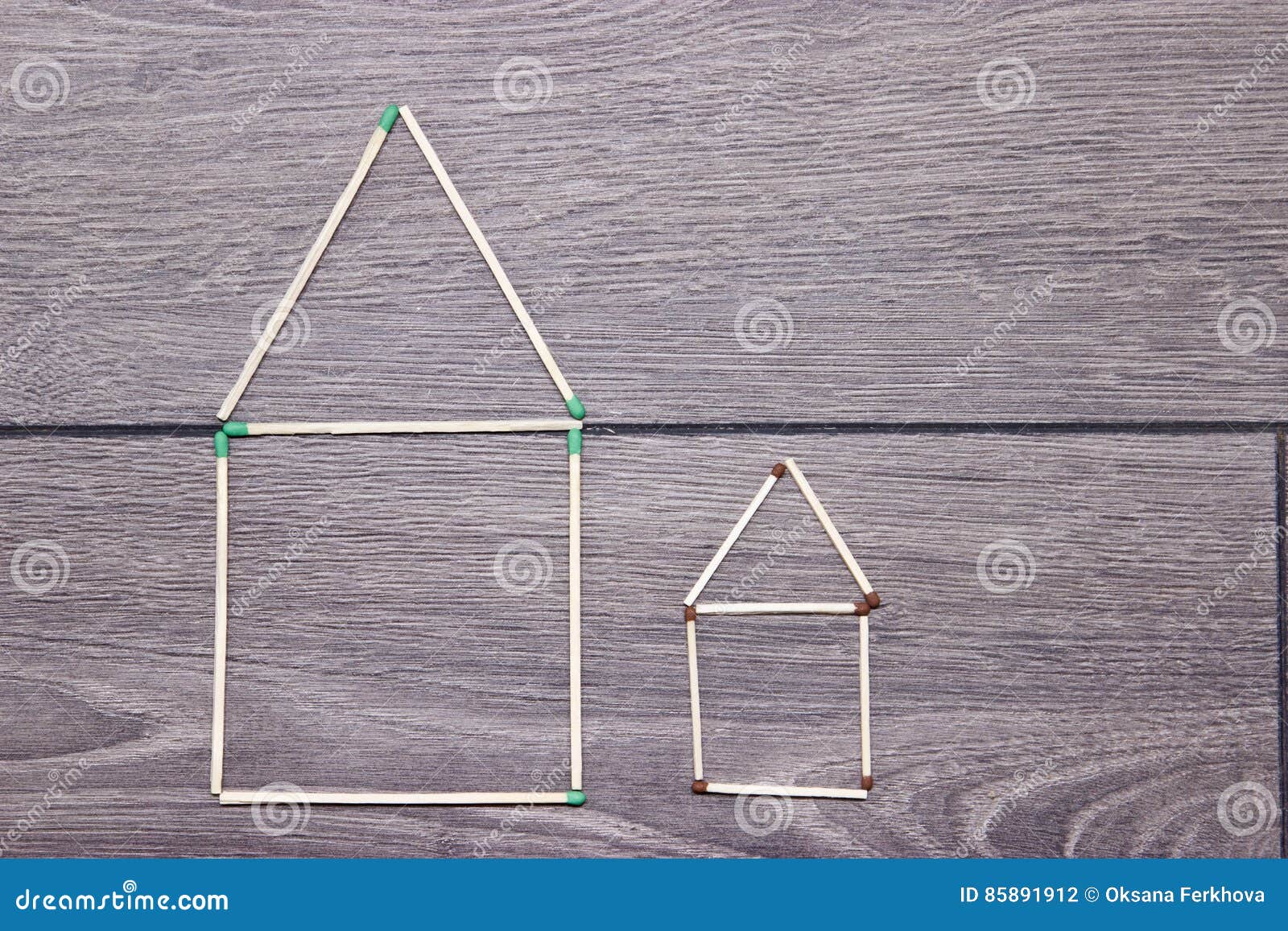 Big and Small House Made of Matches on the Floor. Stock Photo - Image ...