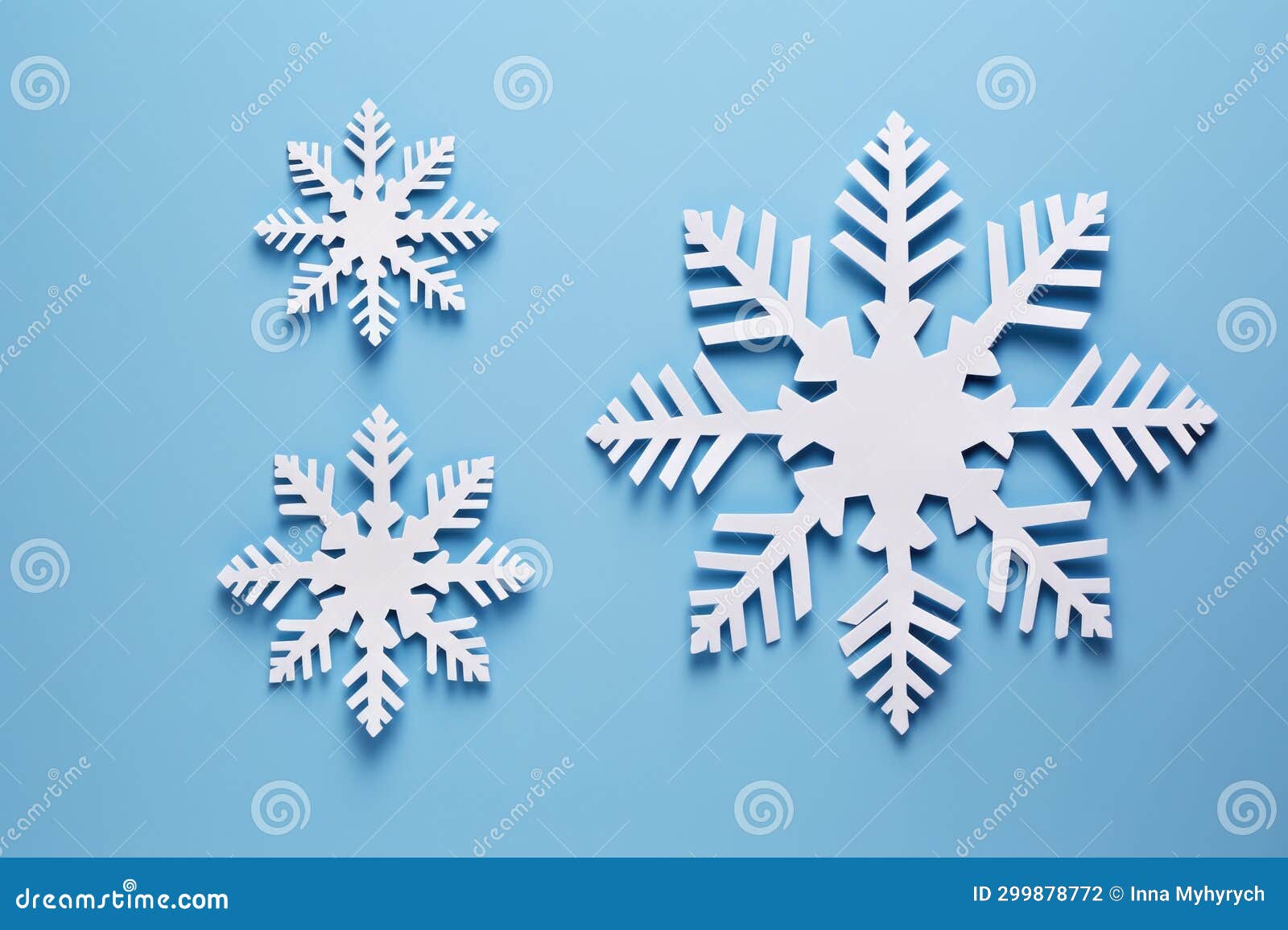 Big and Small Snowflakes on Light Blue Background Stock Illustration ...