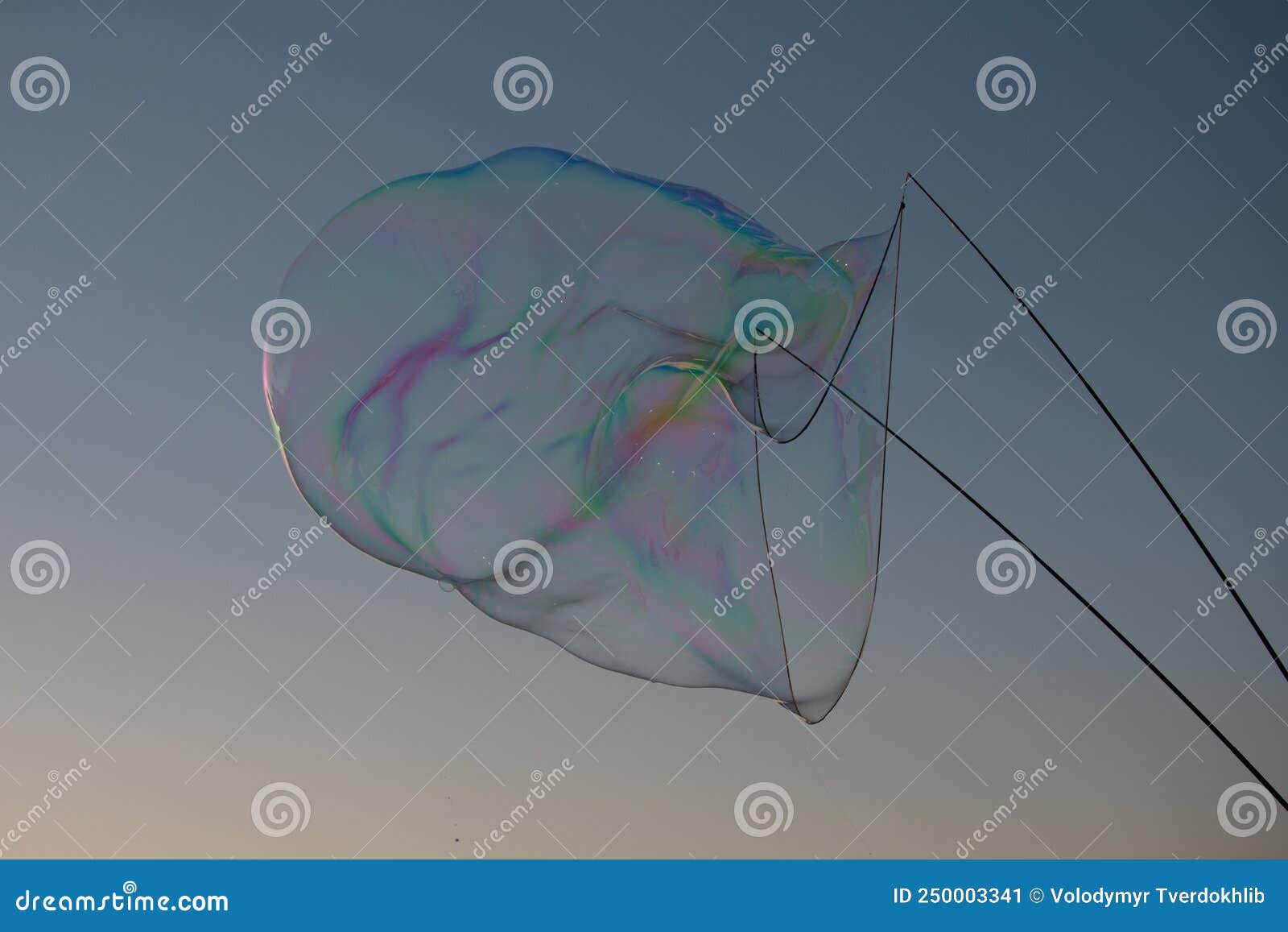 Big Soap Bubbles on Sky Background. Bubble Making with Rope and Sticks ...