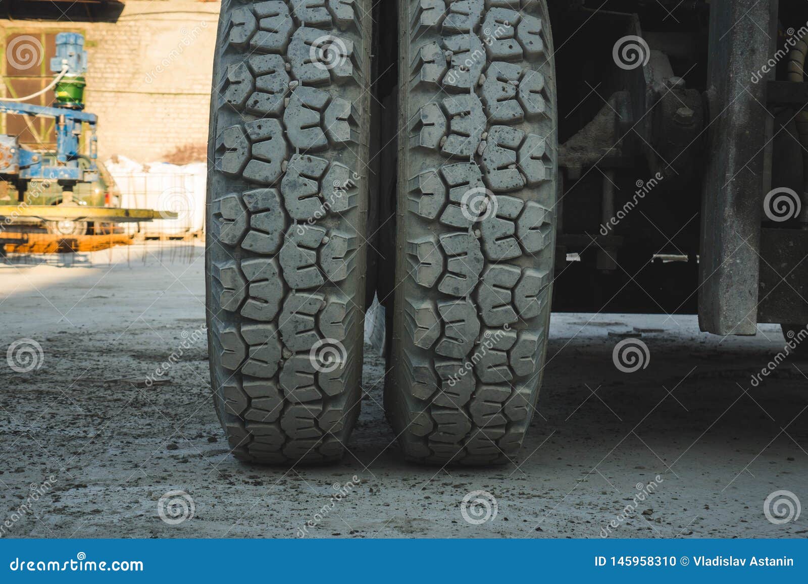 Big Spiked Wheels Of Yellow Tractor Durable Rubber Tires Royalty-Free ...