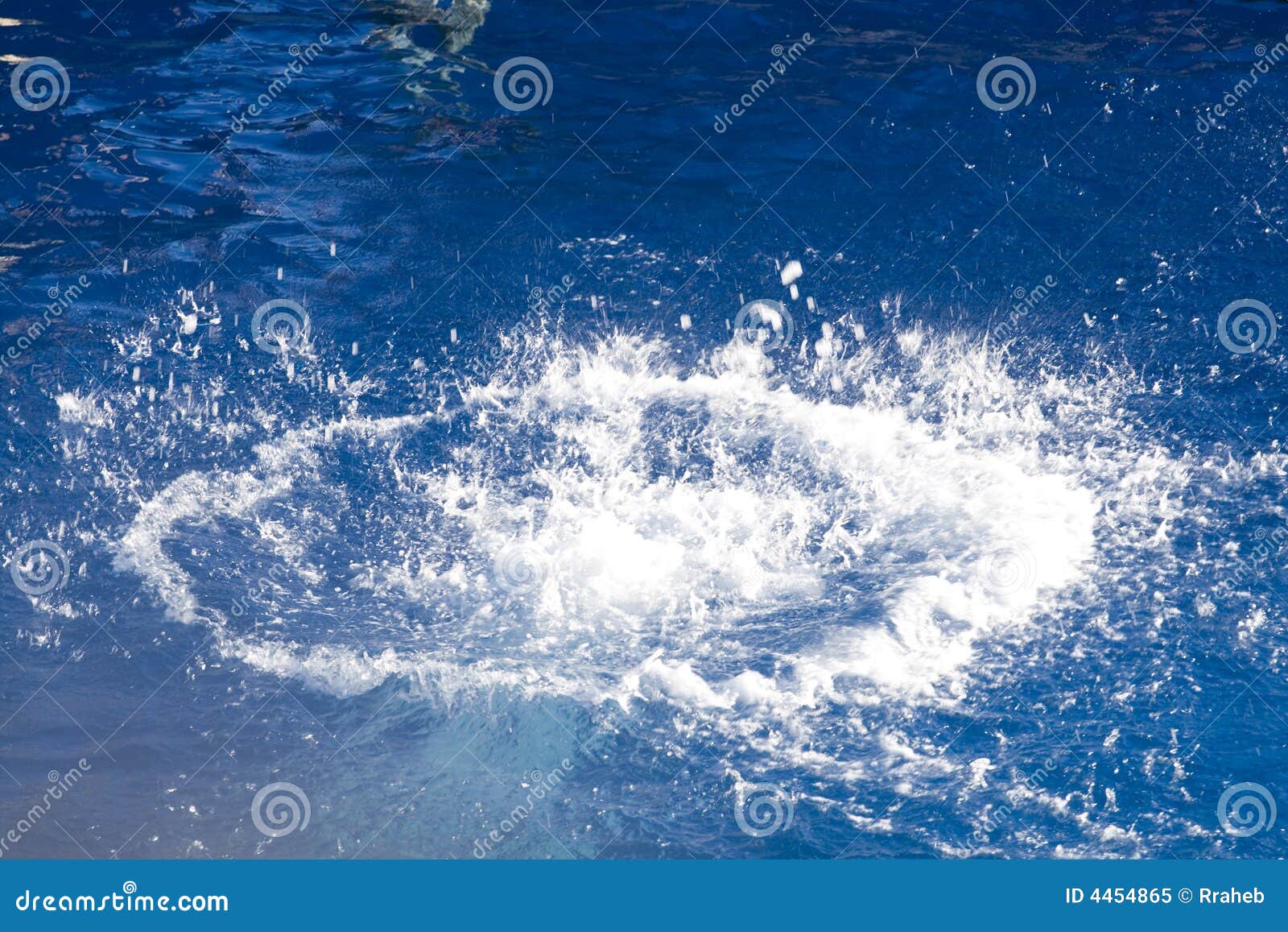 Big Splash In Dark Blue Water Royalty Free Stock Photo - Image: 4454865