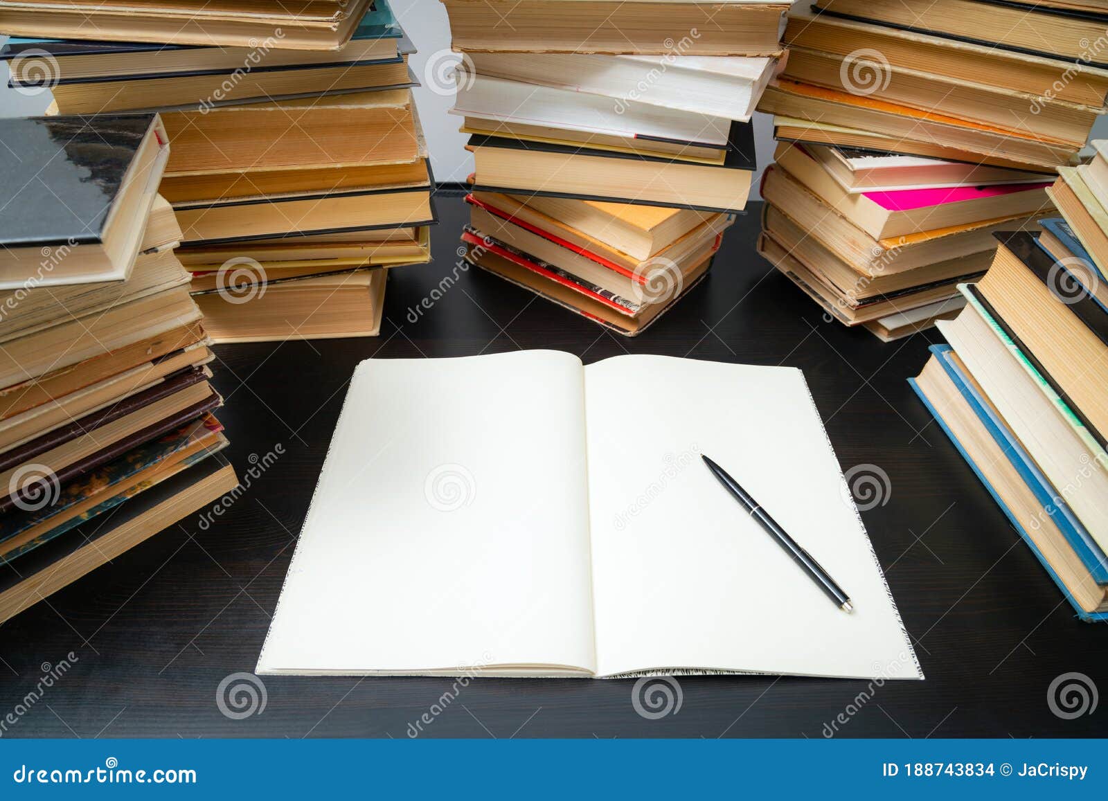 Big Stack of Books on the Table. Studying before the Exam. Pile of ...