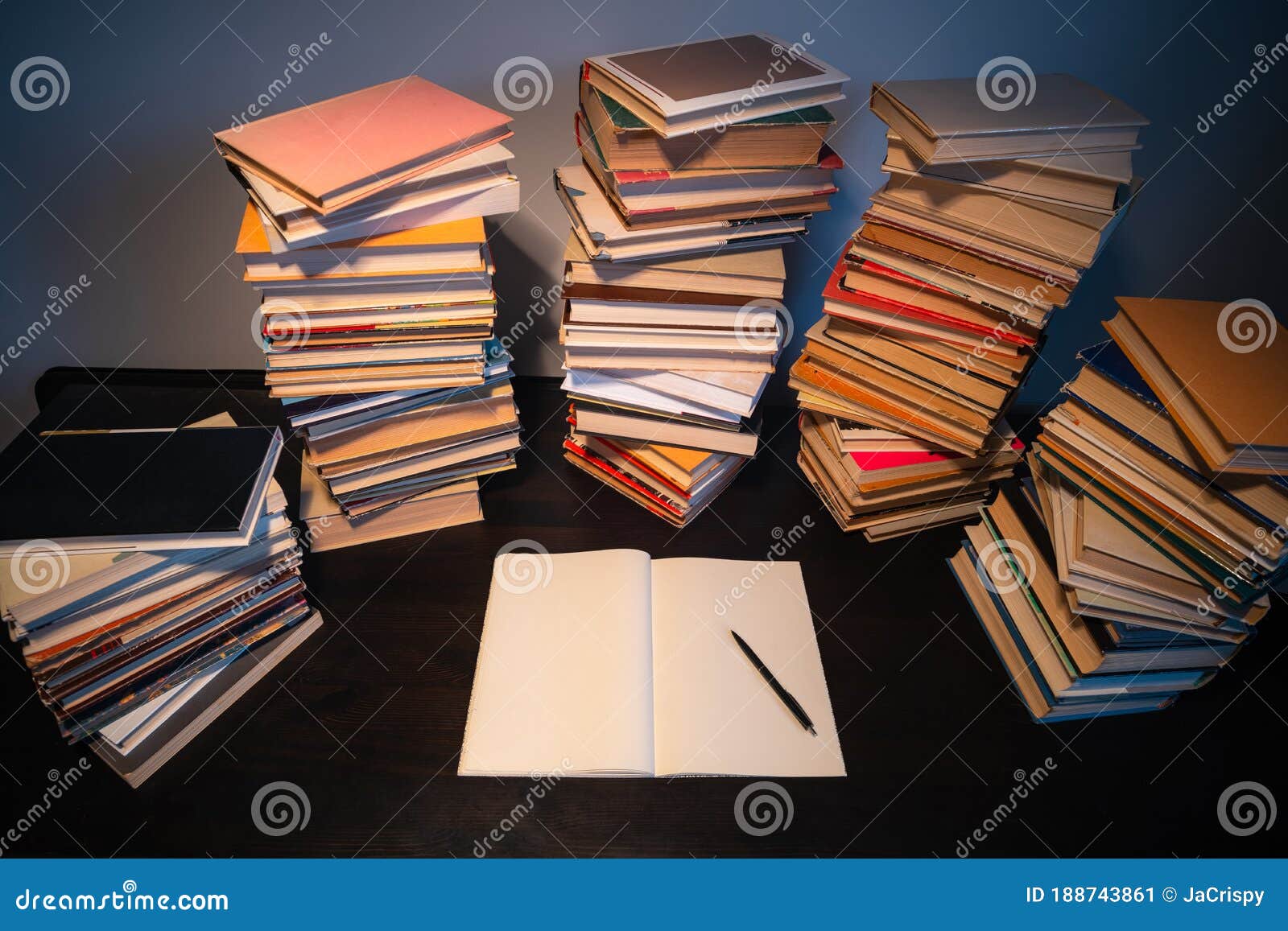 Big Stack of Books on the Table. Studying before the Exam. Pile of ...