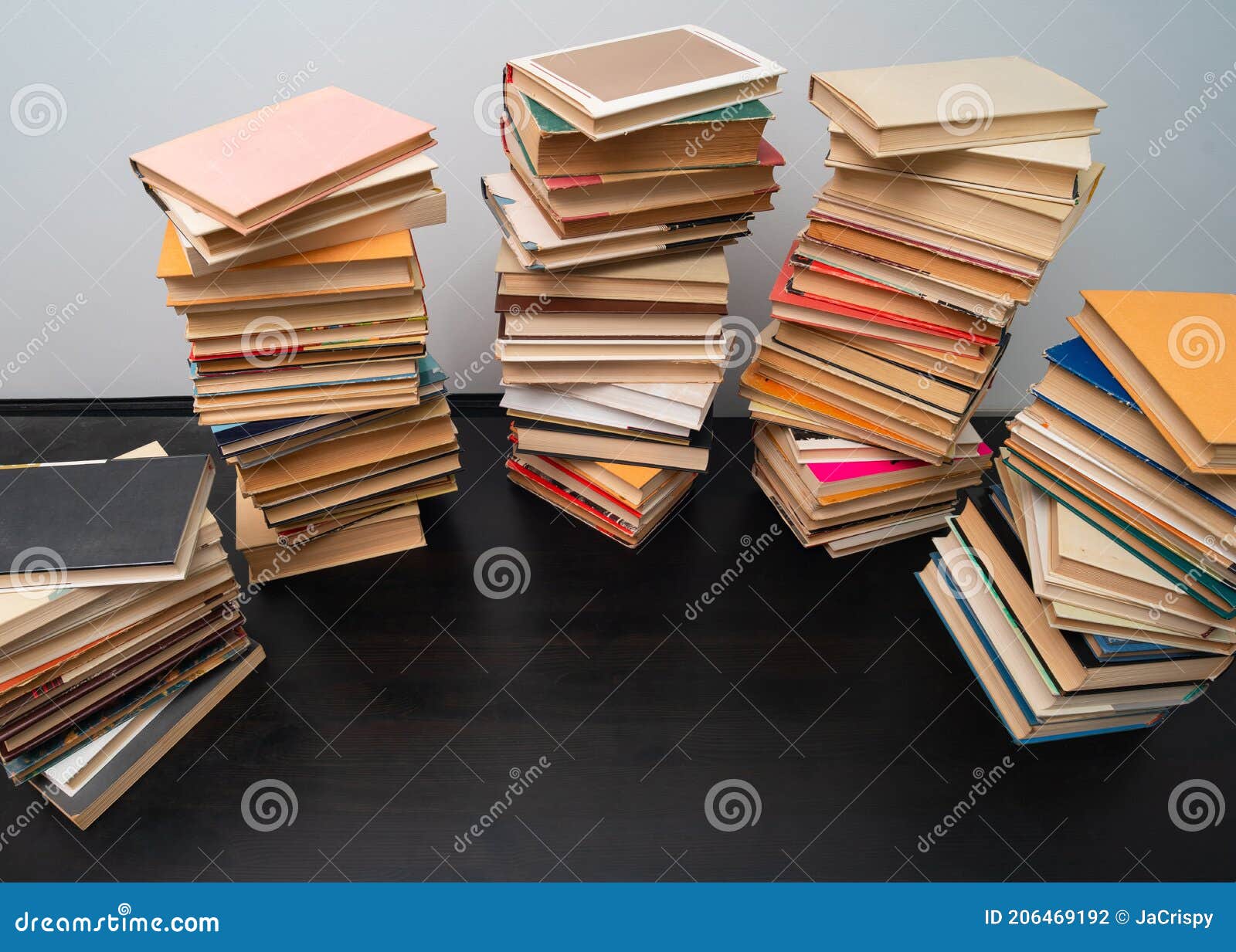 Big Stack of Books on the Table. Studying before the Exam. Pile of ...