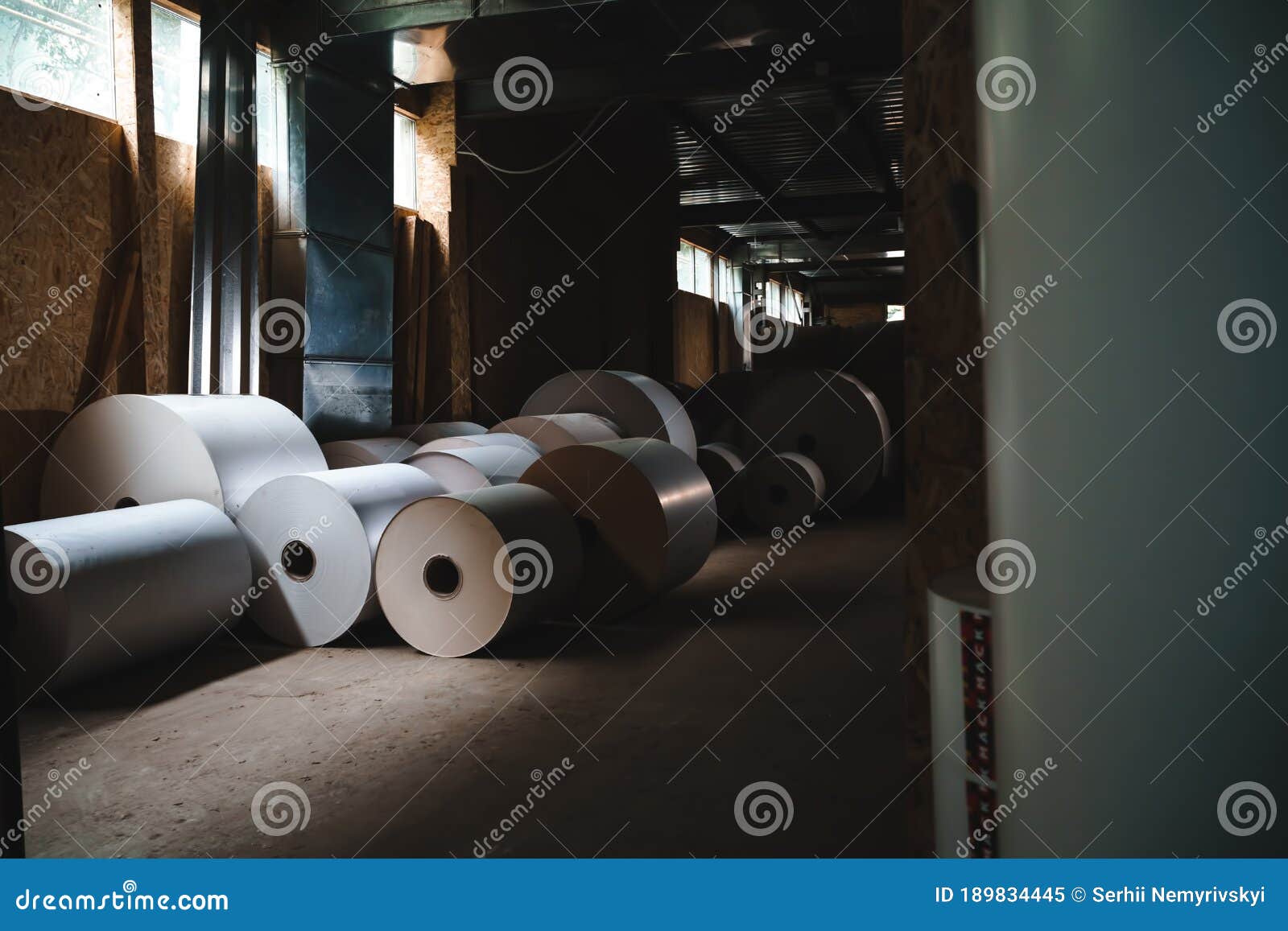Big Stack of Printing Paper Rolls in Warehouse. the Concept of ...