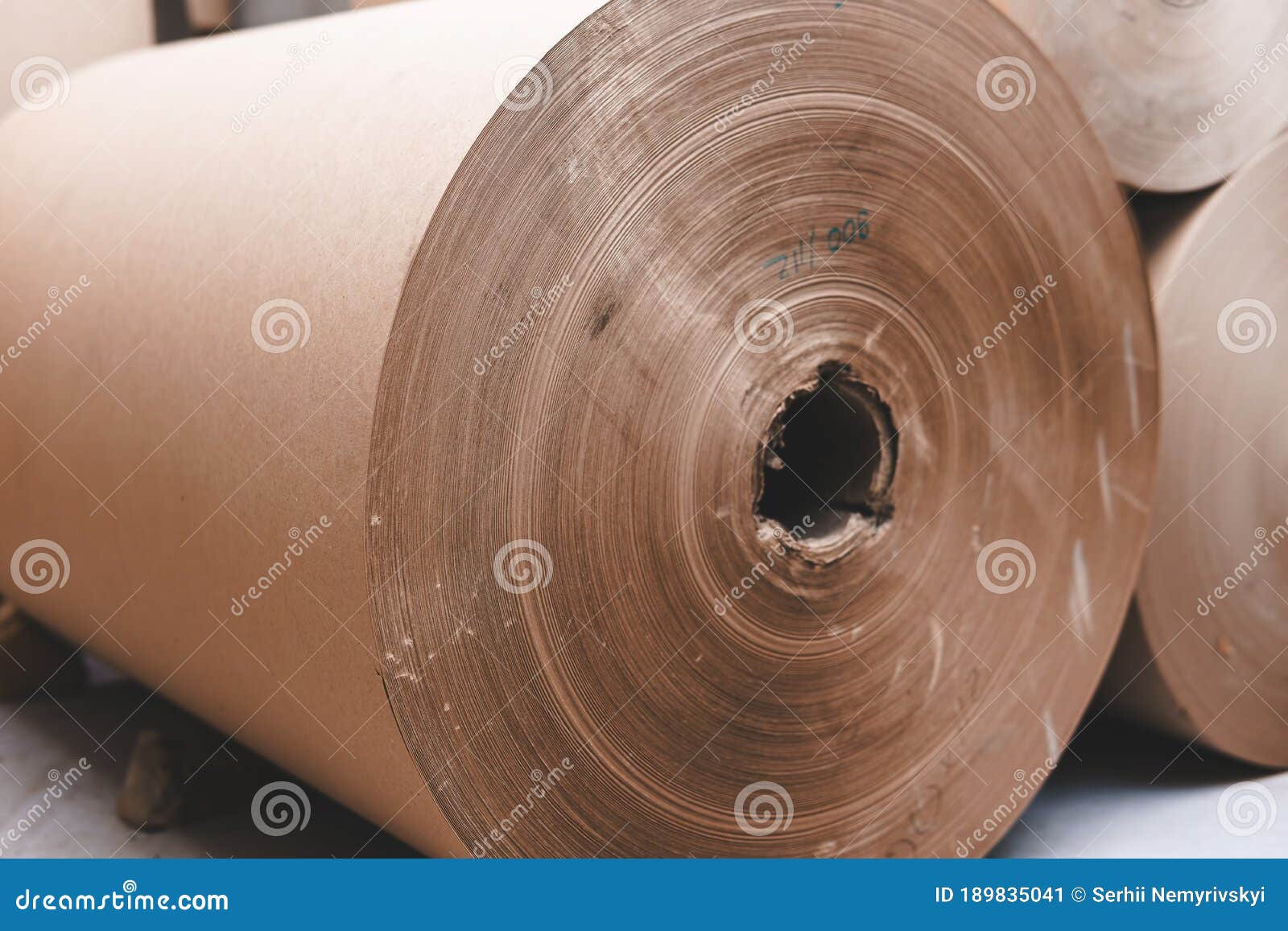 Big Stack of Printing Paper Rolls in Warehouse. the Concept of ...