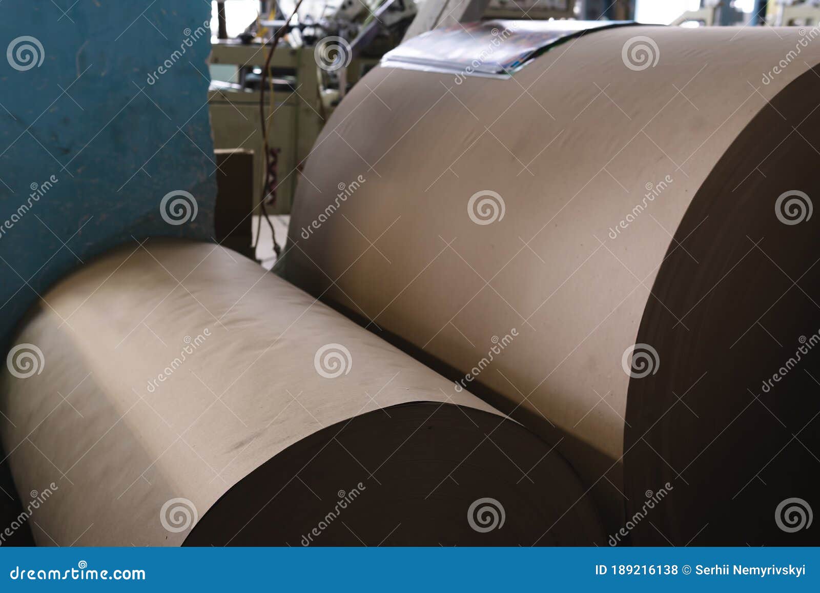 Big Stack of Printing Paper Rolls in Warehouse. the Concept of ...