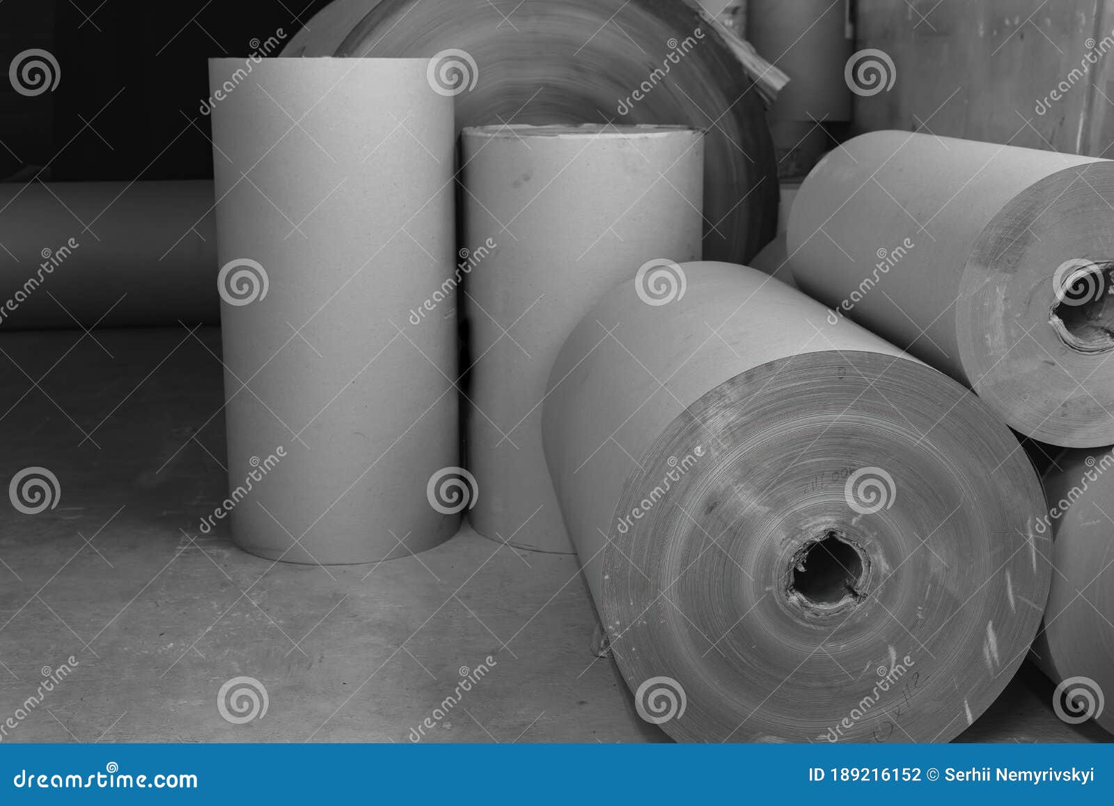 Big Stack of Printing Paper Rolls in Warehouse. the Concept of ...