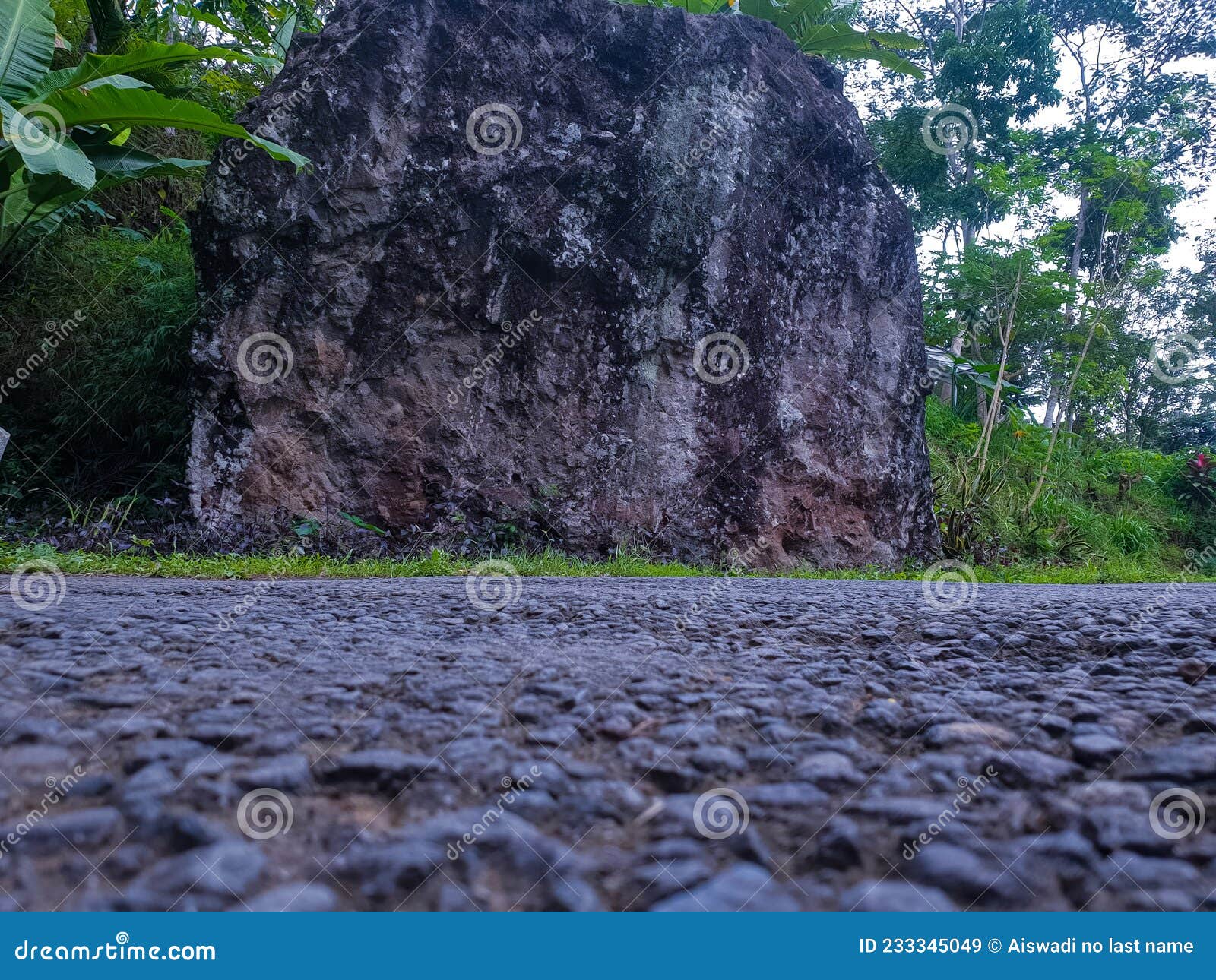 Big Stone on the Side of the Road Stock Image - Image of soil, road ...