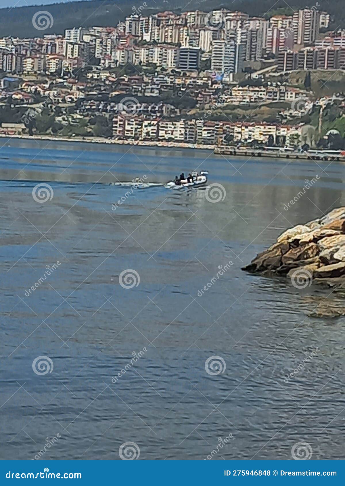 Big stones, blue shiny sea stock photo. Image of stones - 275946848