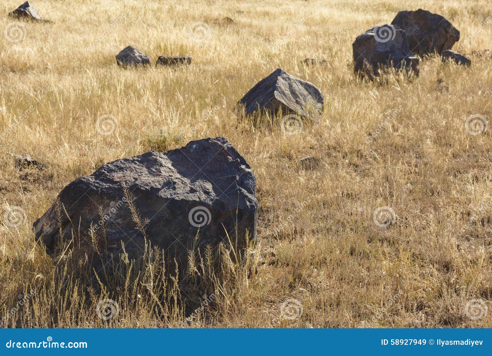 Big stones on the field stock image. Image of barren - 58927949