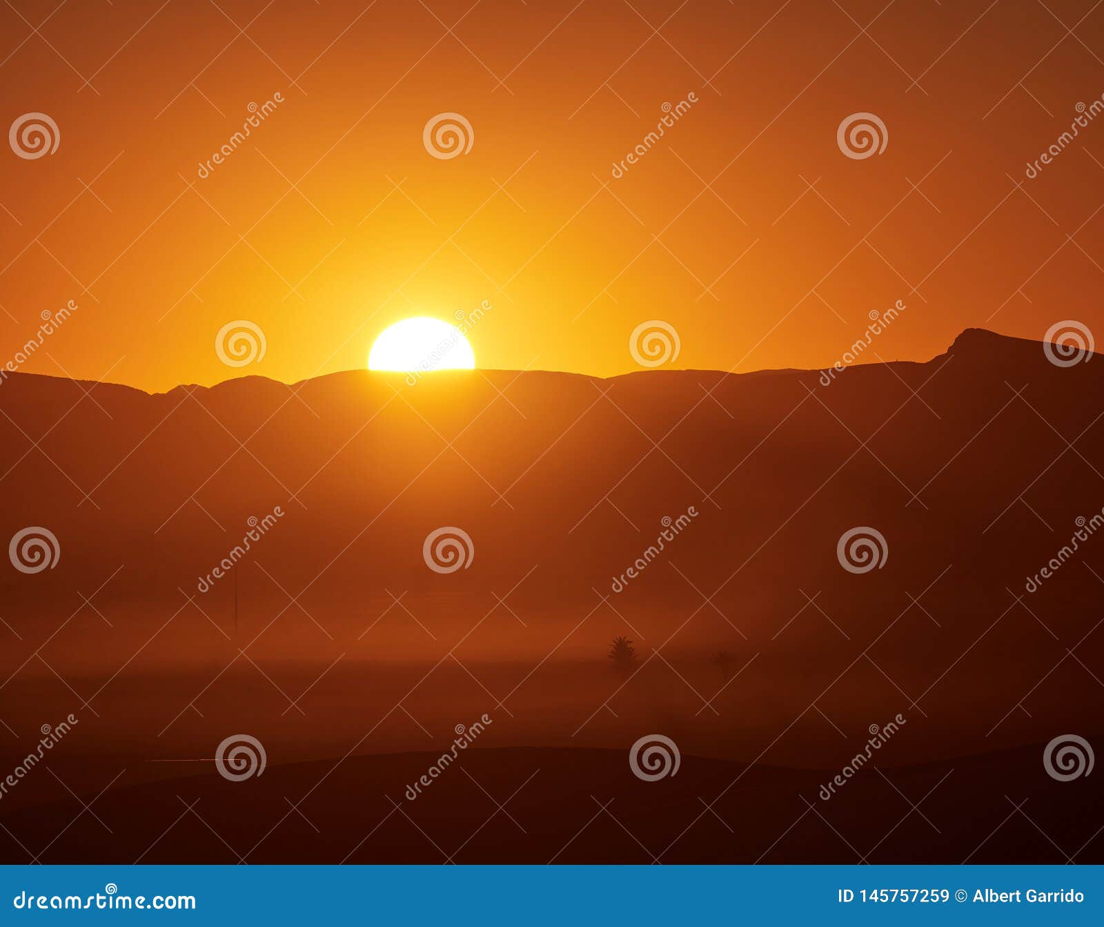 Big Sun Setting in the Desert Full of Dust Stock Image - Image of wave ...