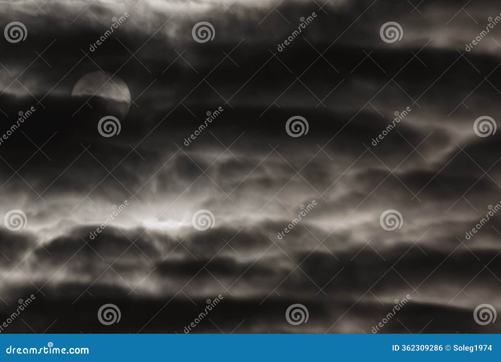 The Big Sun is Shining through a Dark Stormy Sky. an Impressive ...