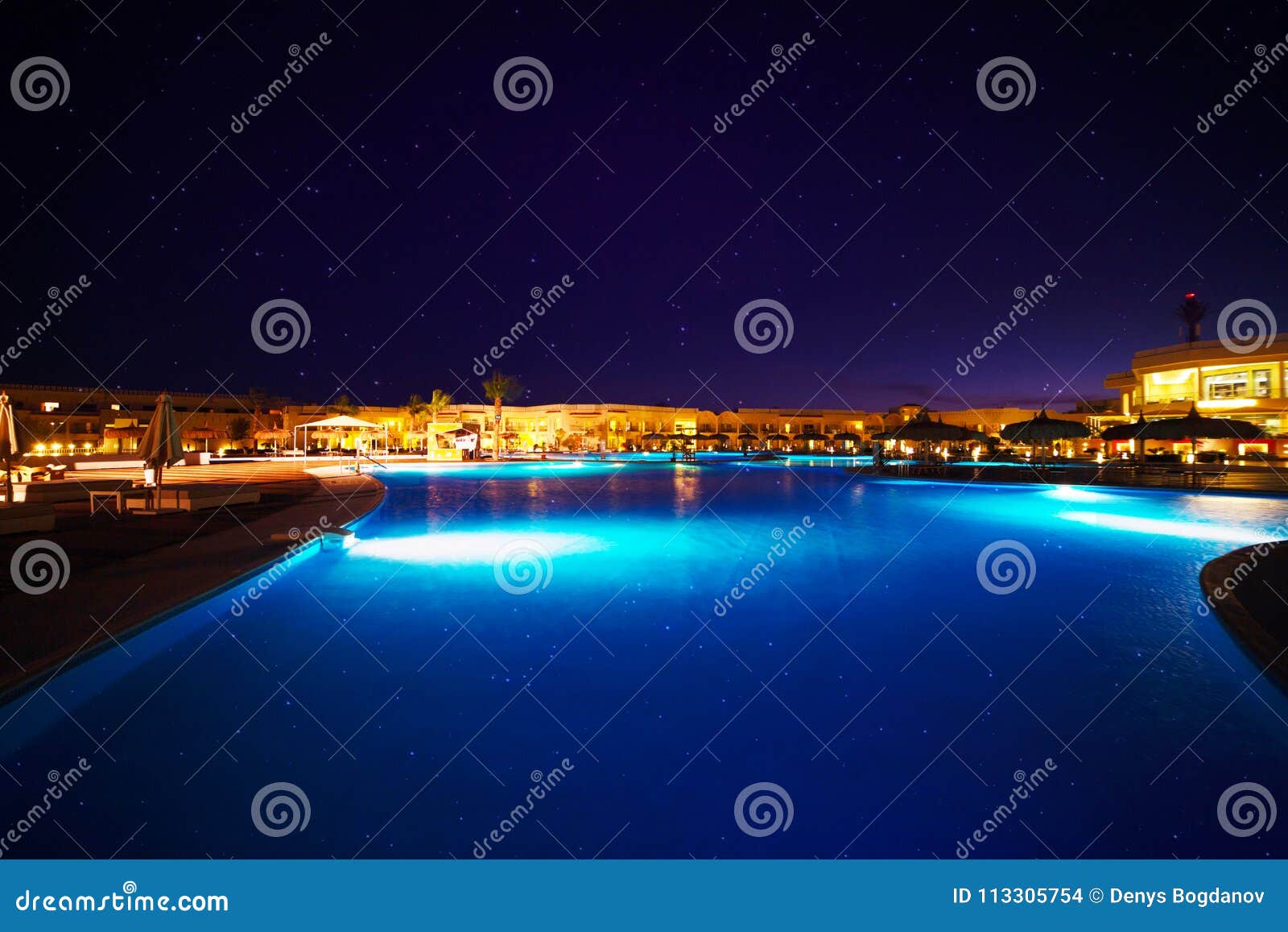 A Big Swimming Pool at Night Under Stars Stock Photo - Image of city ...