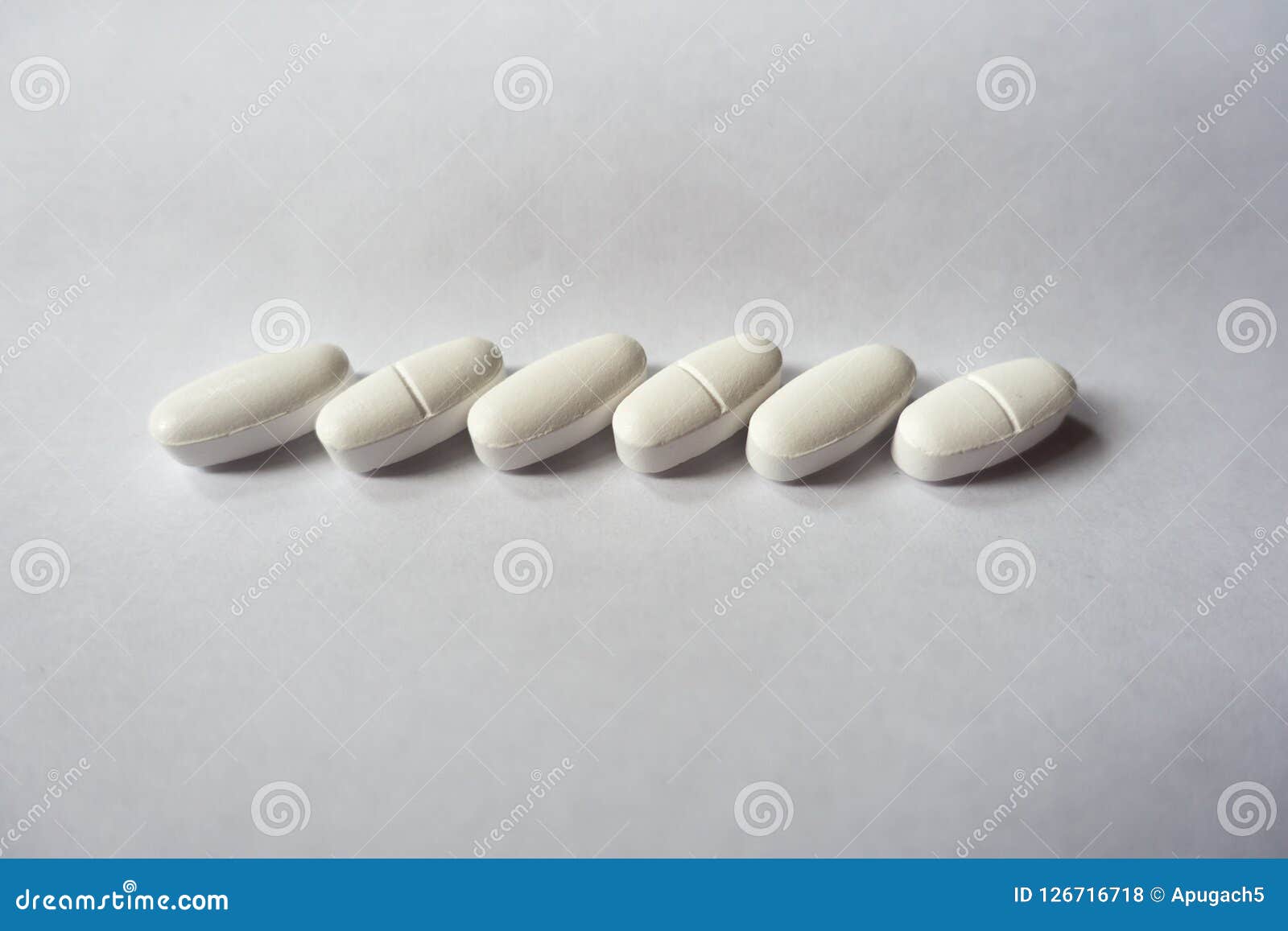 Big Tablets of Calcium in a Row Stock Photo - Image of dietary, bone ...