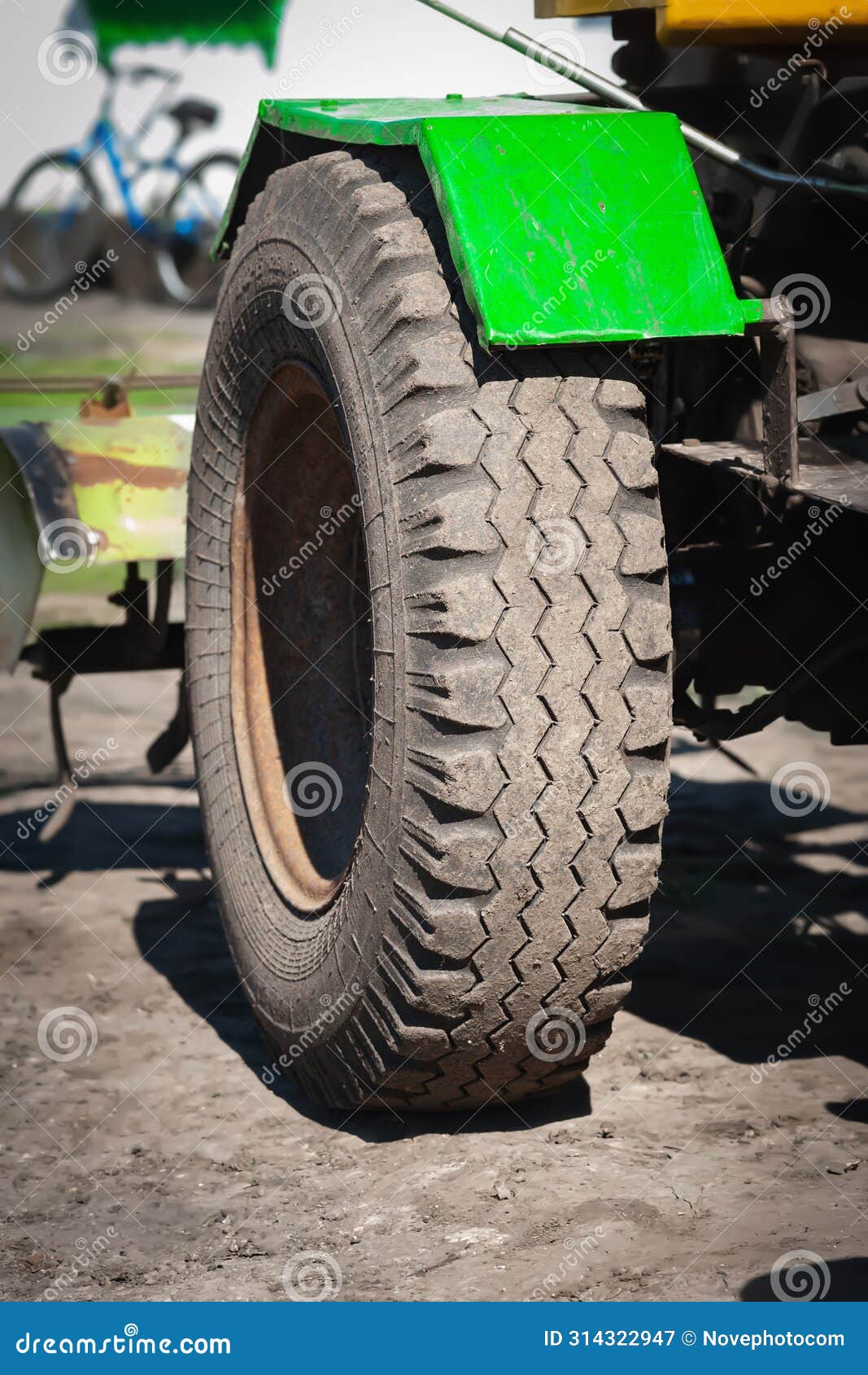 Big Tire. Tractor Wheel Close-up. Selective Focus Stock Image - Image ...