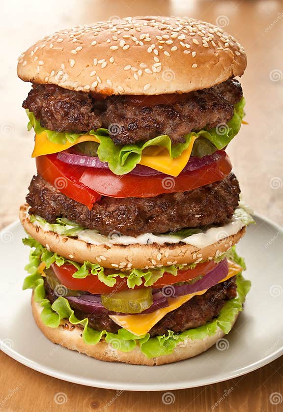 Big Triple Cheeseburger stock photo. Image of junkfood - 38308120