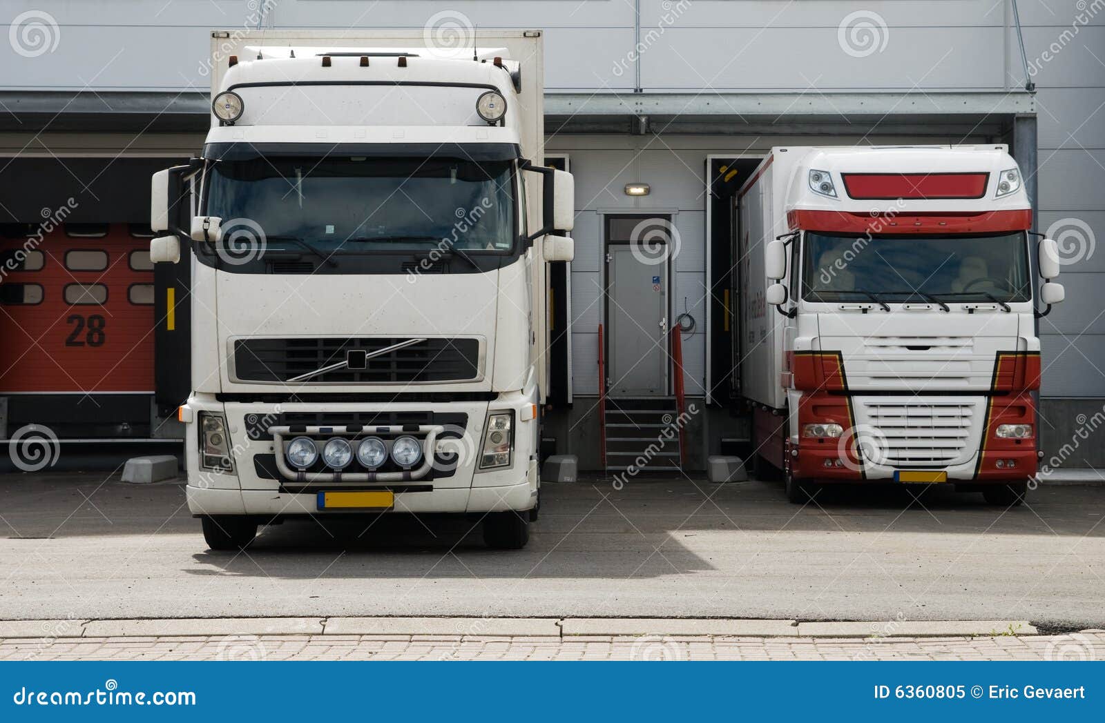 Big trucks at loading dock stock image. Image of automobile - 6360805