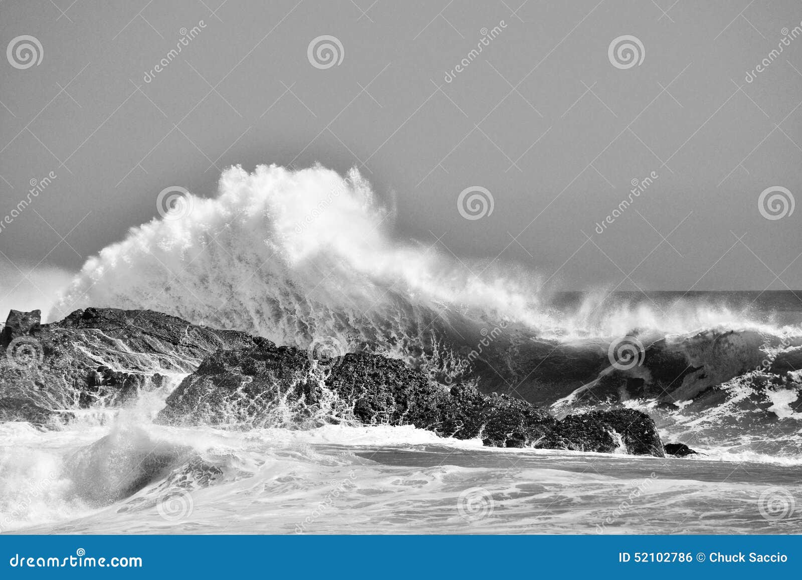 Big wave crashes on rocks stock photo. Image of crashes - 52102786