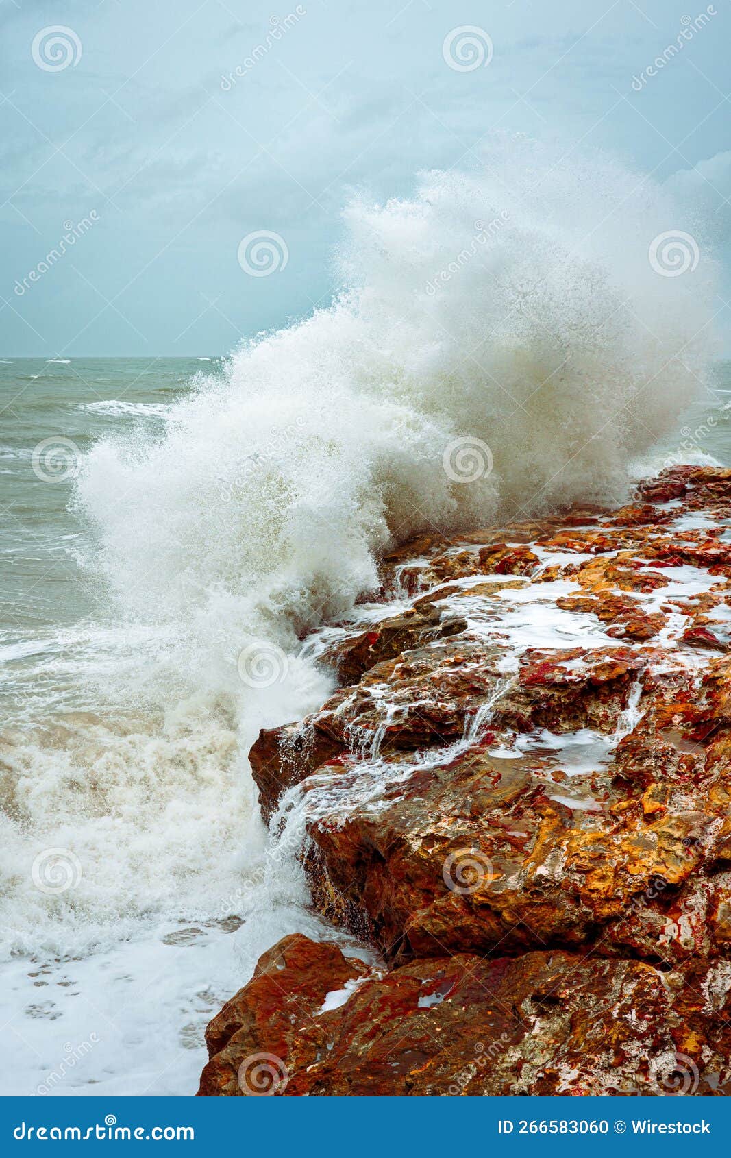 Big Wave Splashing Against Rocks by the Beach Stock Photo - Image of ...