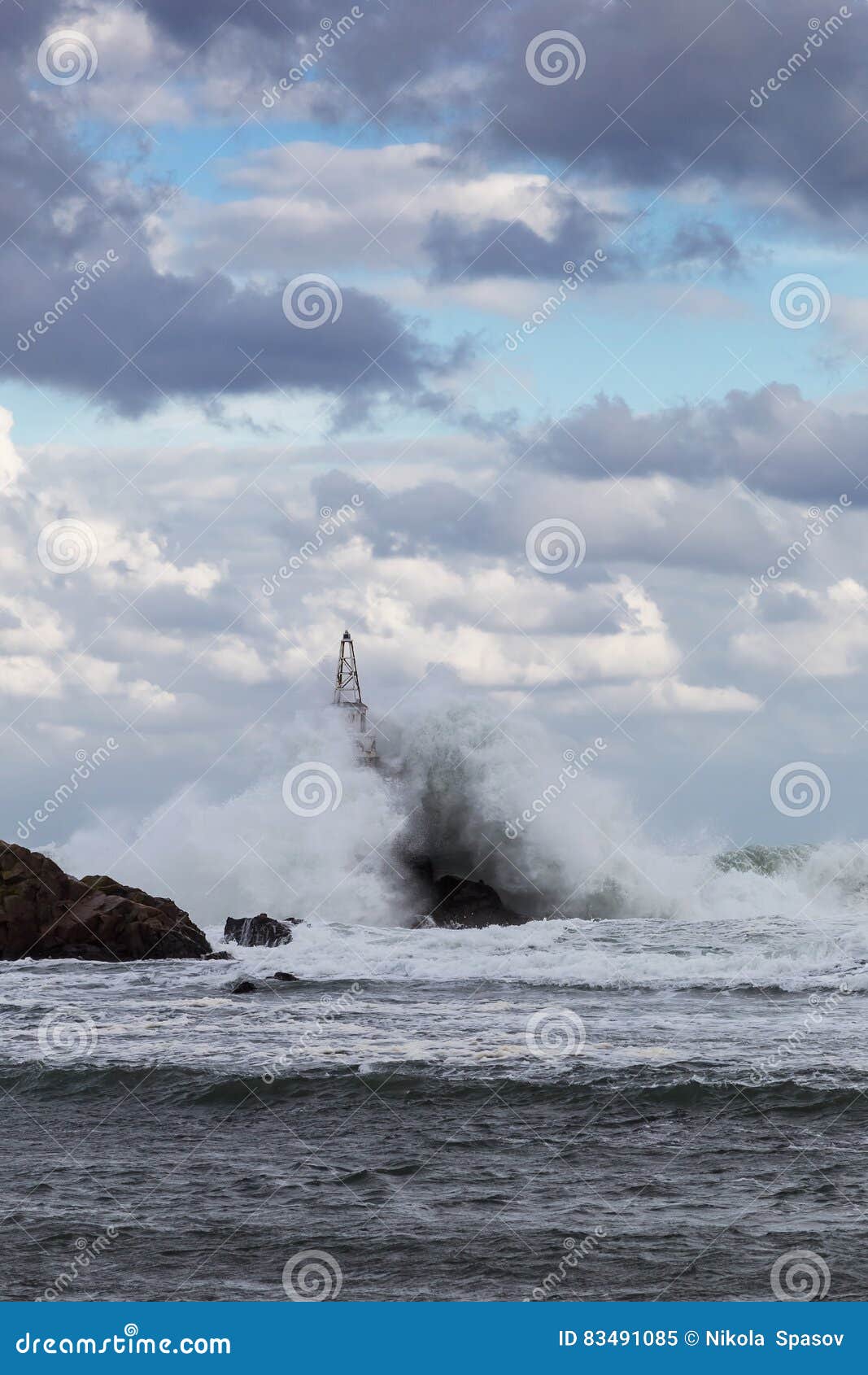 Big Waves Crashing into Lighthouse Stock Image - Image of crash, cliff ...