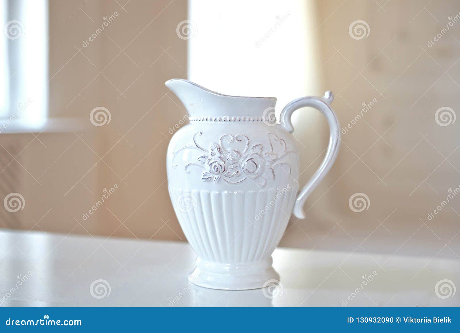 Big White Ceramic Jug on the Table in Big Bright Room Stock Photo ...