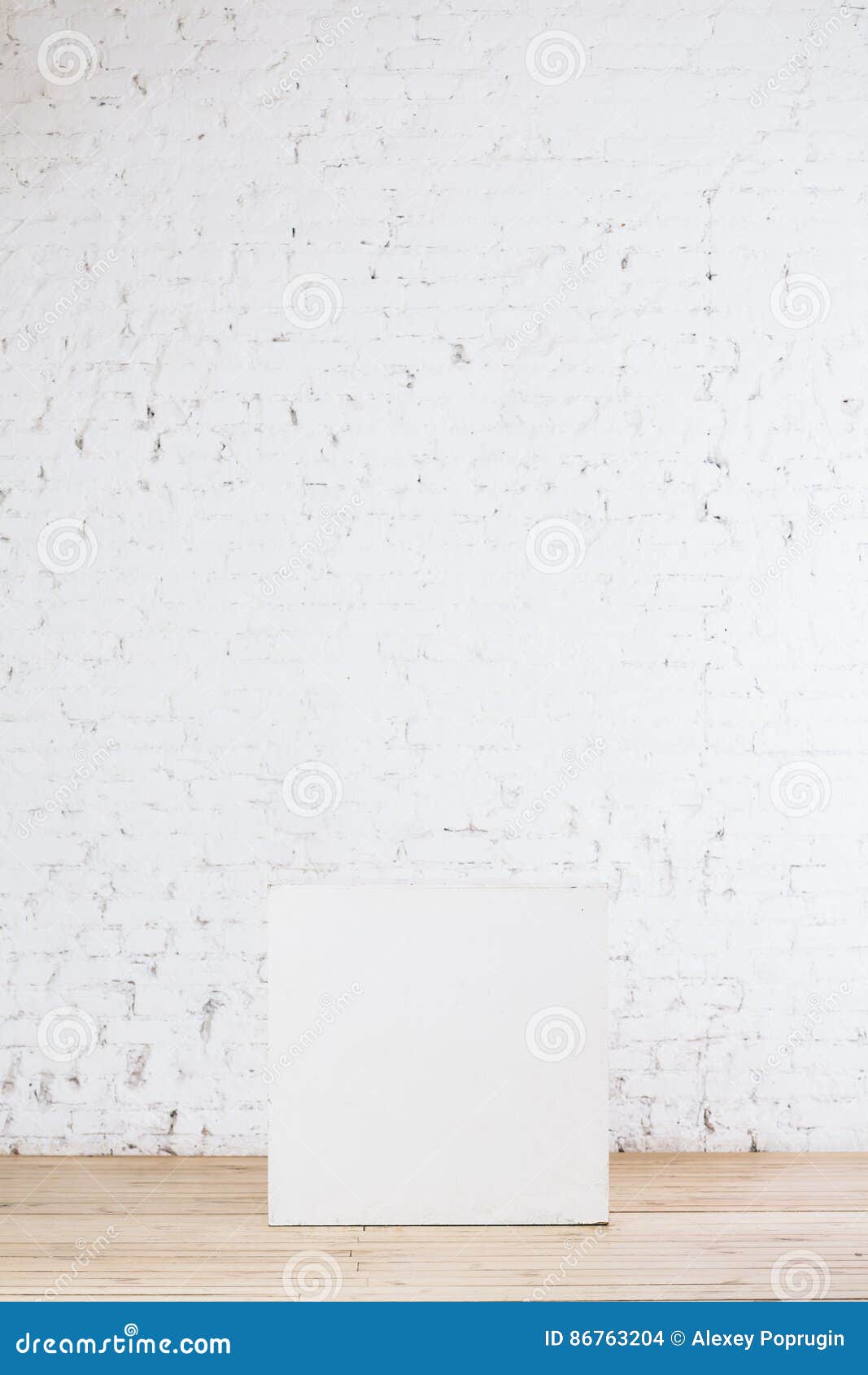 Big White Cube Standing in Front of Painted Brick Wall Stock Photo ...