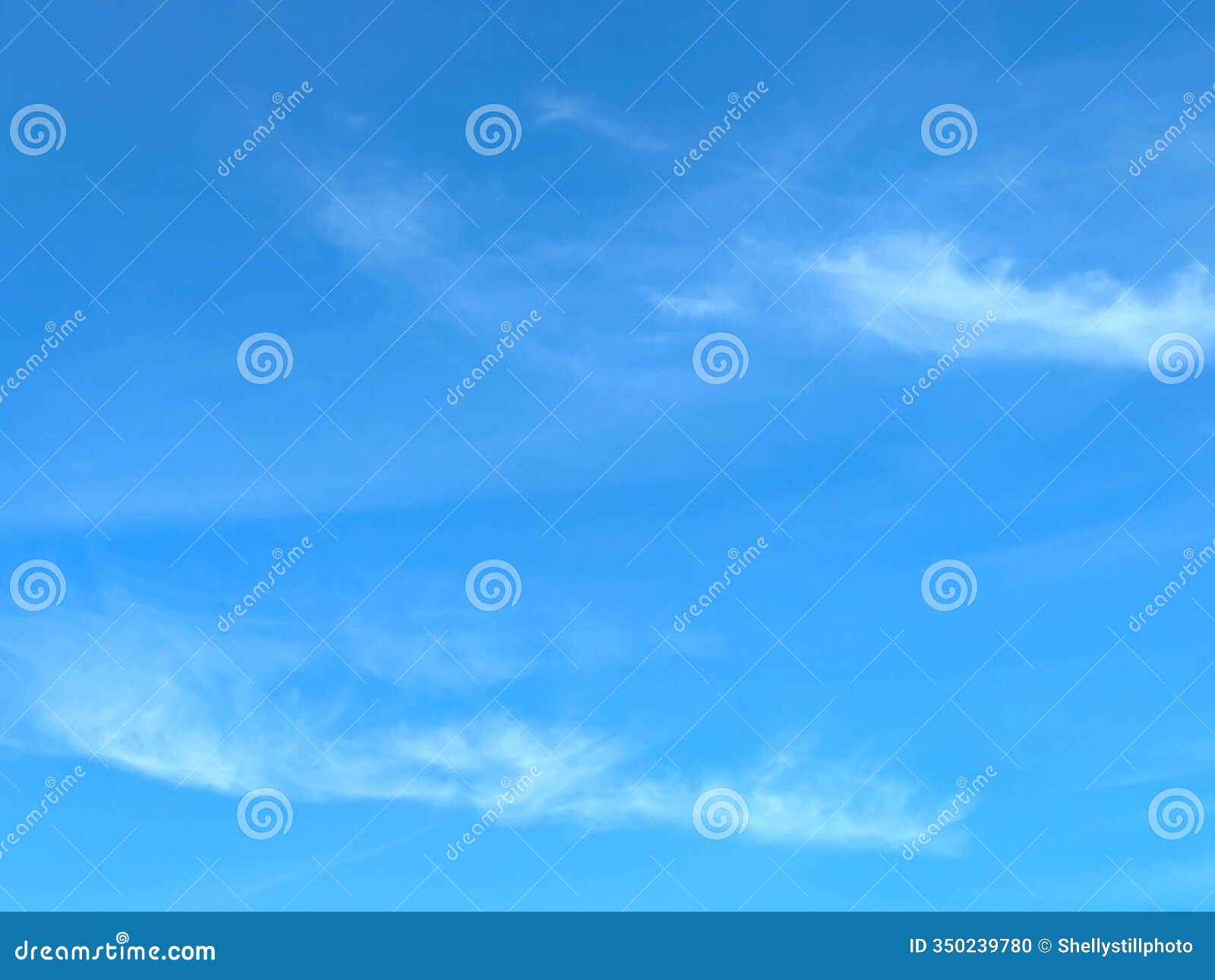Big White Fluffy Clouds on a Blue Sky with Fine Whispy Lines Stock ...