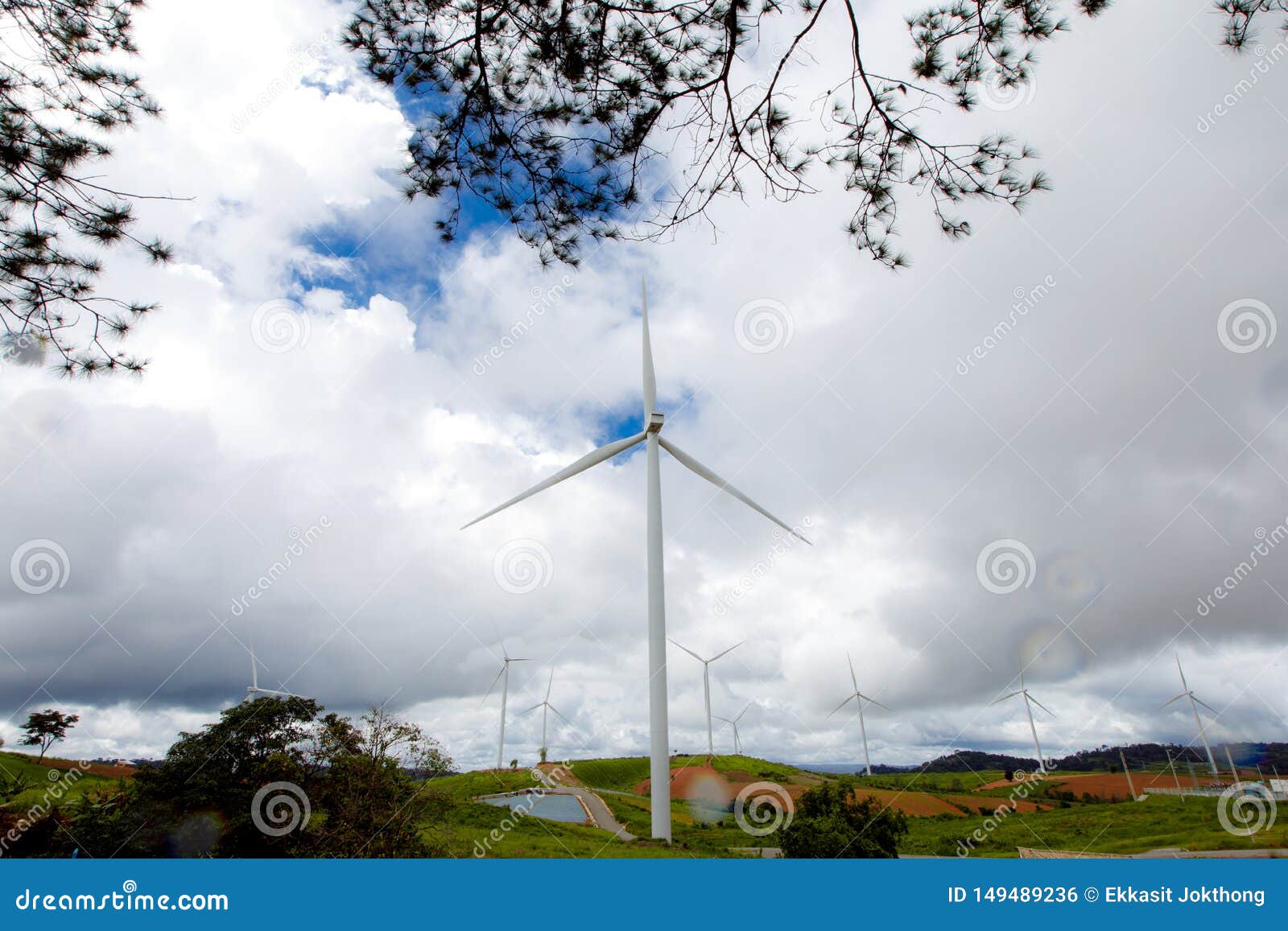 Big Wind Wheel in the Blue Sky Full of Cloud and the Green Hill after ...
