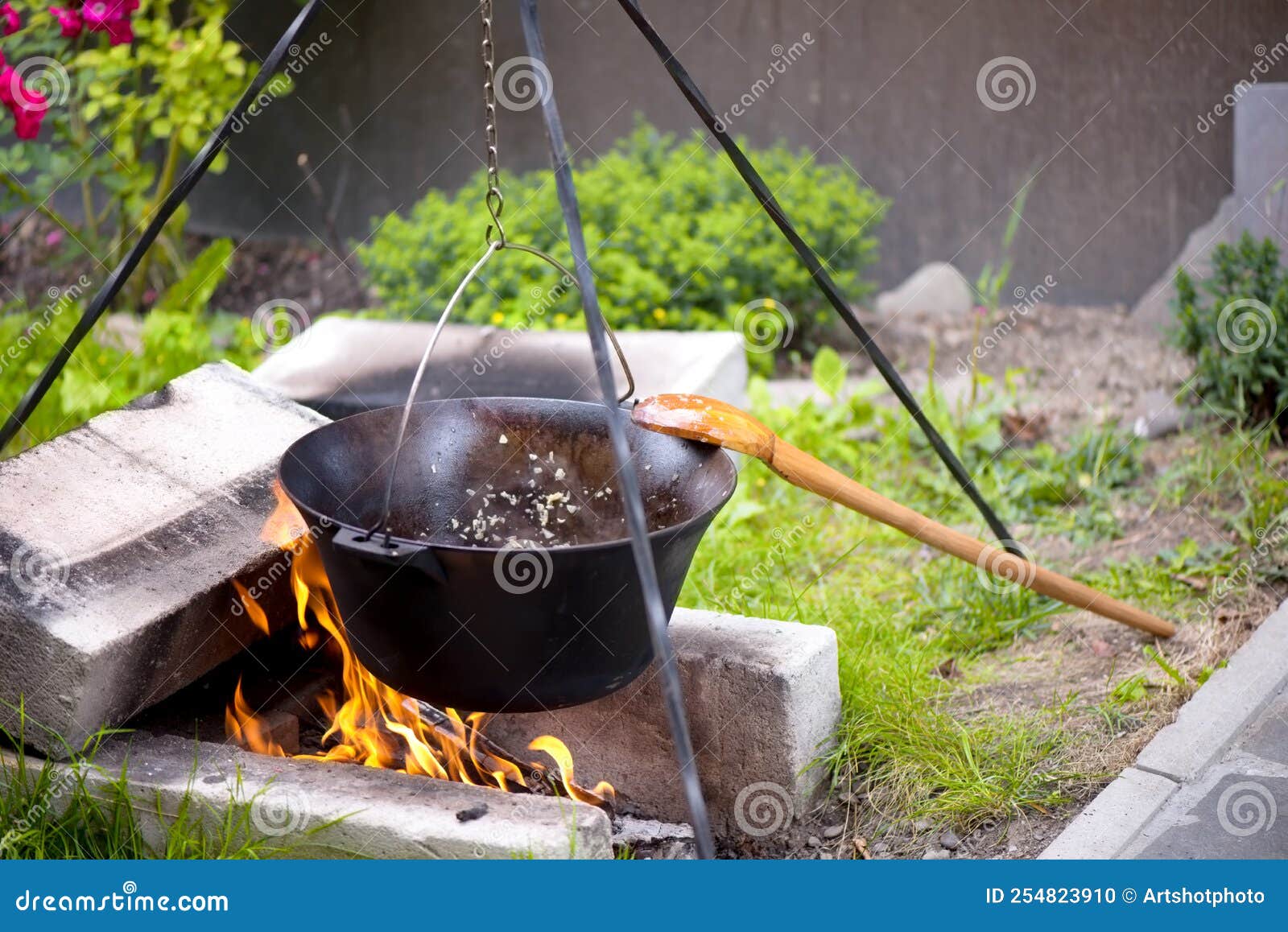 Big Wooden Spoon and a Cauldron on Fire Stock Photo - Image of wood ...