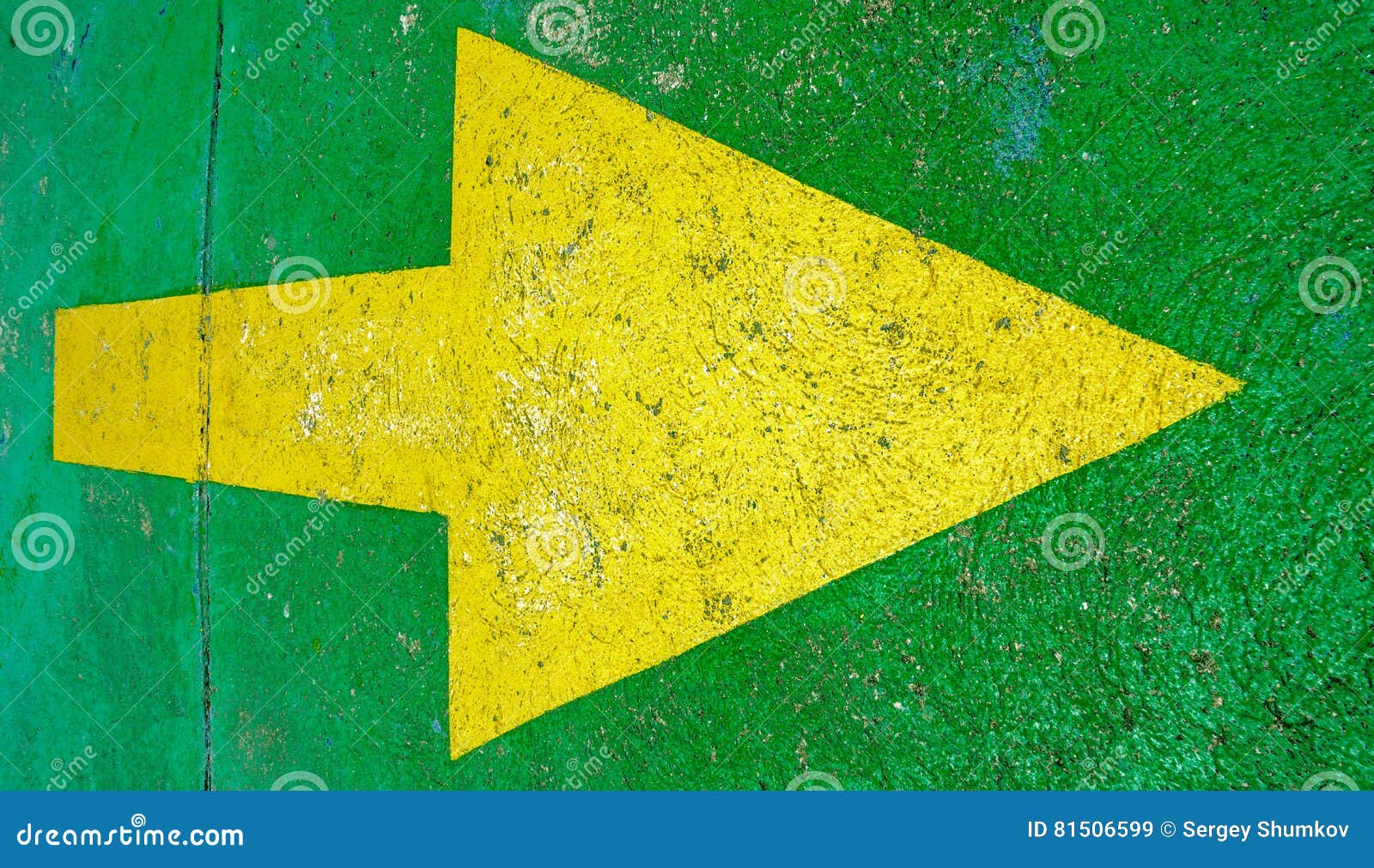Big Yellow Arrow Pointing To the Right with Green Background Stock ...