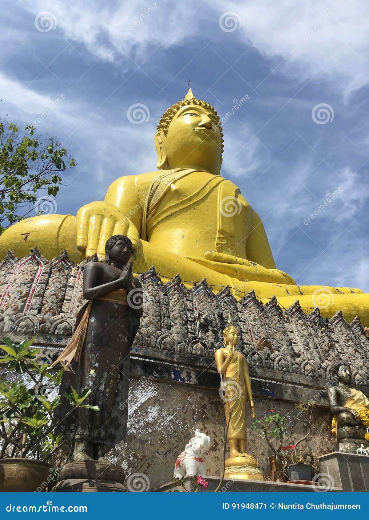 The big yellow buddha. stock image. Image of subduing - 91948471