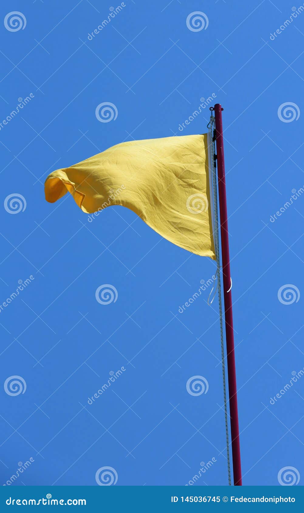 Big Yellow Flag Symbol of Danger of Warning Stock Image - Image of pole ...