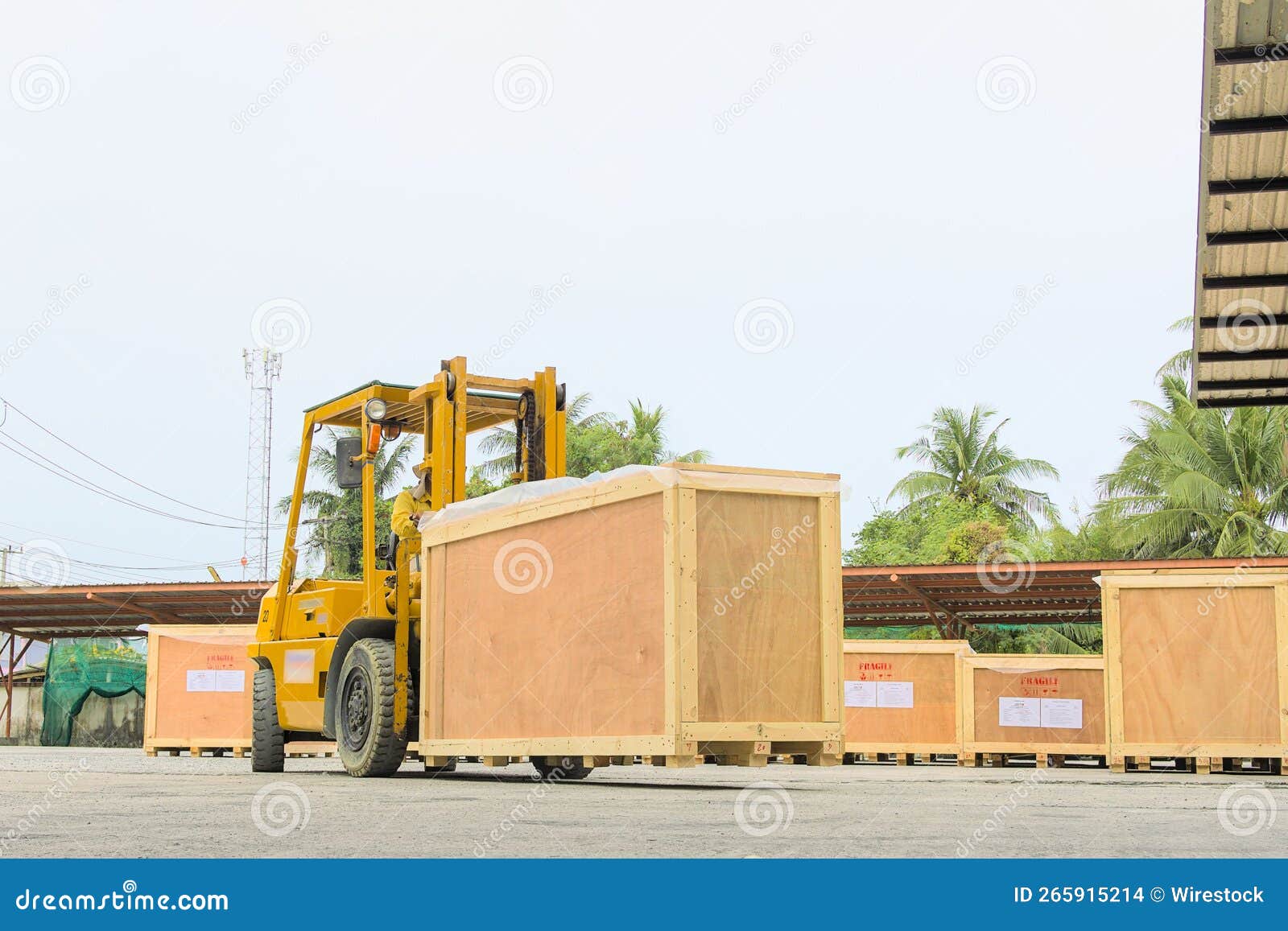 Forklift Lifting And Moving Bricks On A Pallet On Construction Site ...