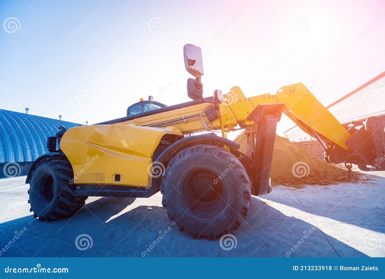 Big Yellow Forklift Loader Working Near Warehouse Stock Photo - Image ...