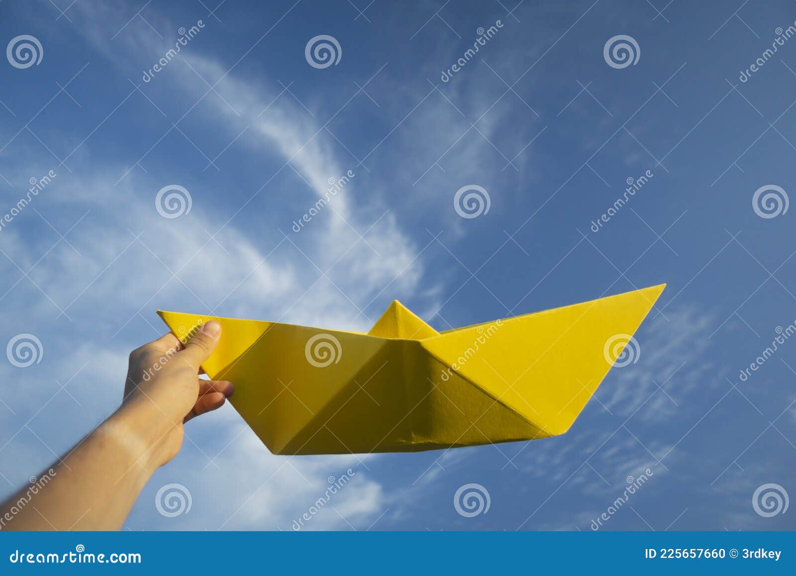 Big Yellow Paper Boat with Blue Sky and White Clouds Stock Photo ...