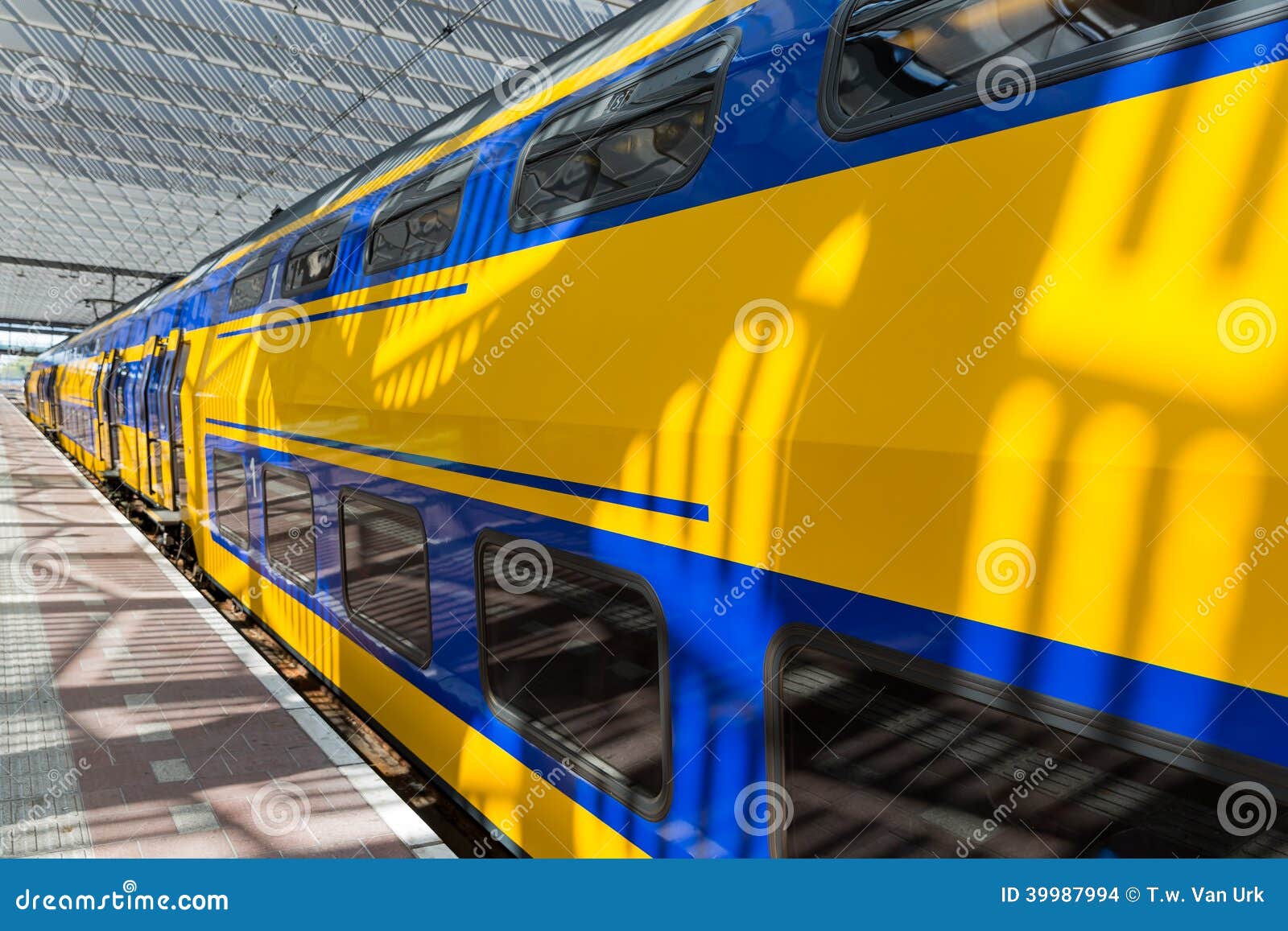 Big Yellow Train at a Dutch Railway Station Stock Photo - Image of ...