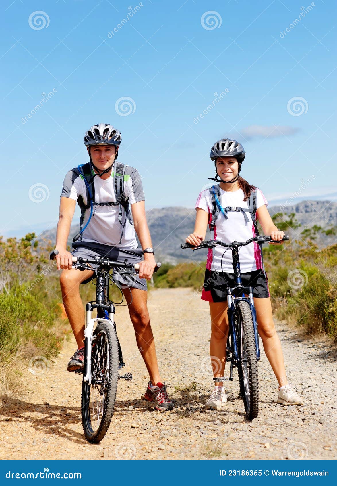 Bike couple stock image. Image of couple, biking, laughing - 23186365