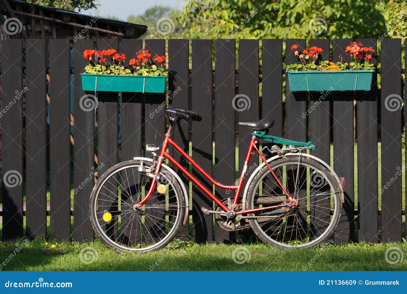Bike and fence stock image. Image of flower, village - 21136609