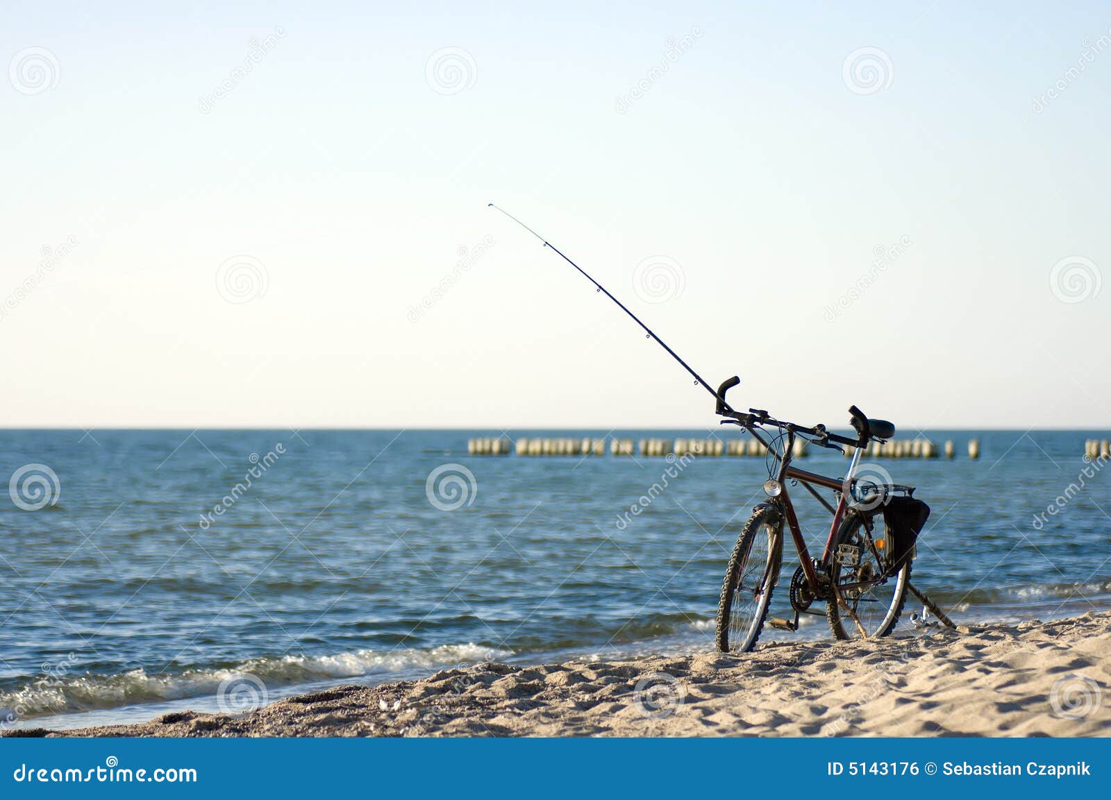 Bike and fishing rod stock photo. Image of sandy, bike - 5143176