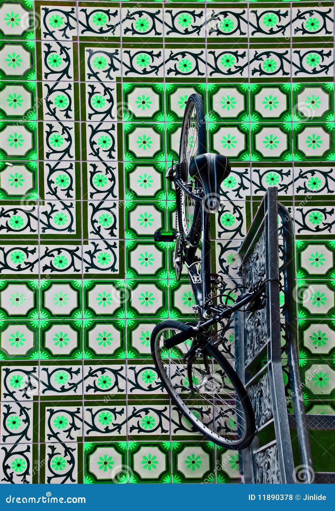 Bike on green tile floor stock photo. Image of floor - 11890378