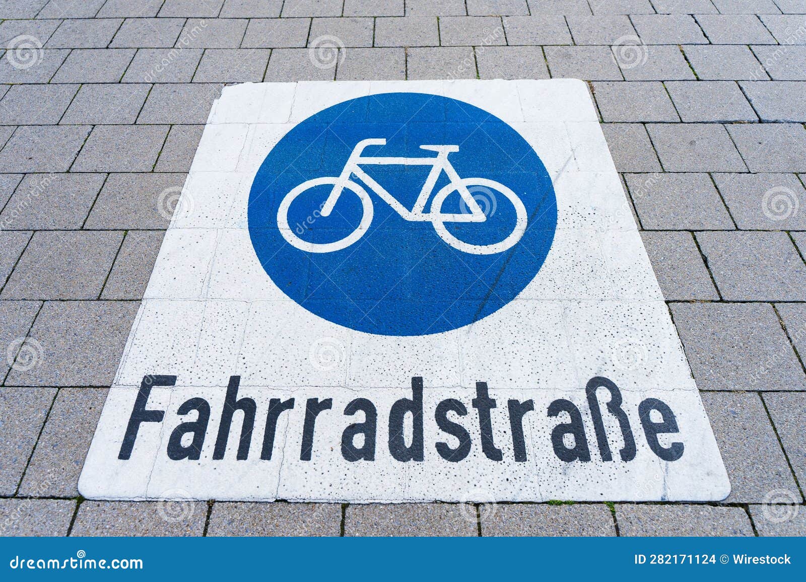 Bike Lane Sign on the Cobblestone Pathway in Germany Stock Photo ...