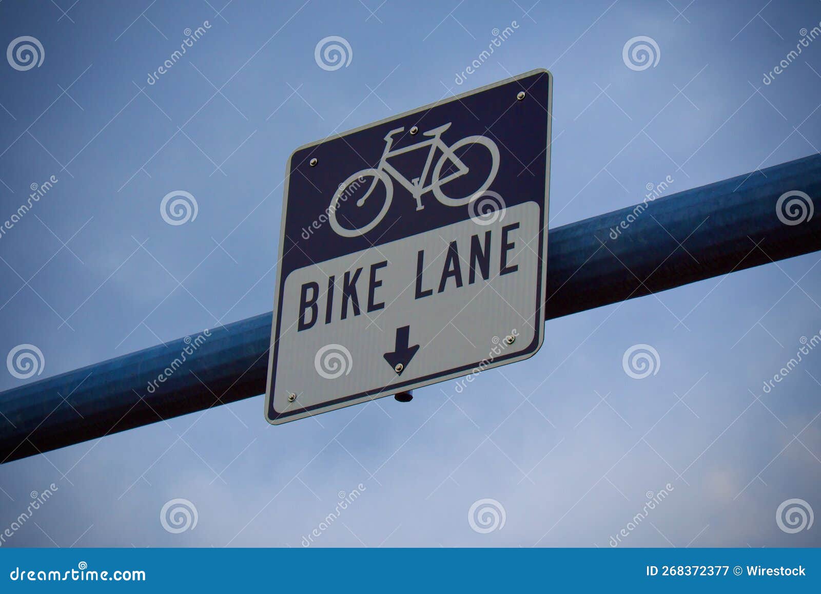 Bike lane sign on a pole stock image. Image of safety - 268372377