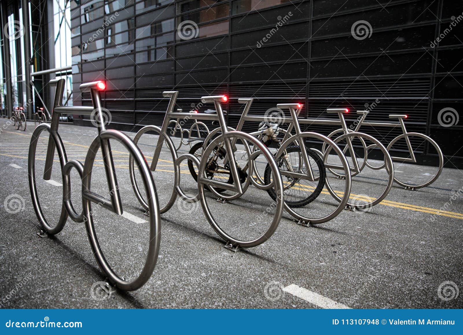 Bicycle Racks Enclosed By A Semi Circular Hinged Roof Called A Bike ...
