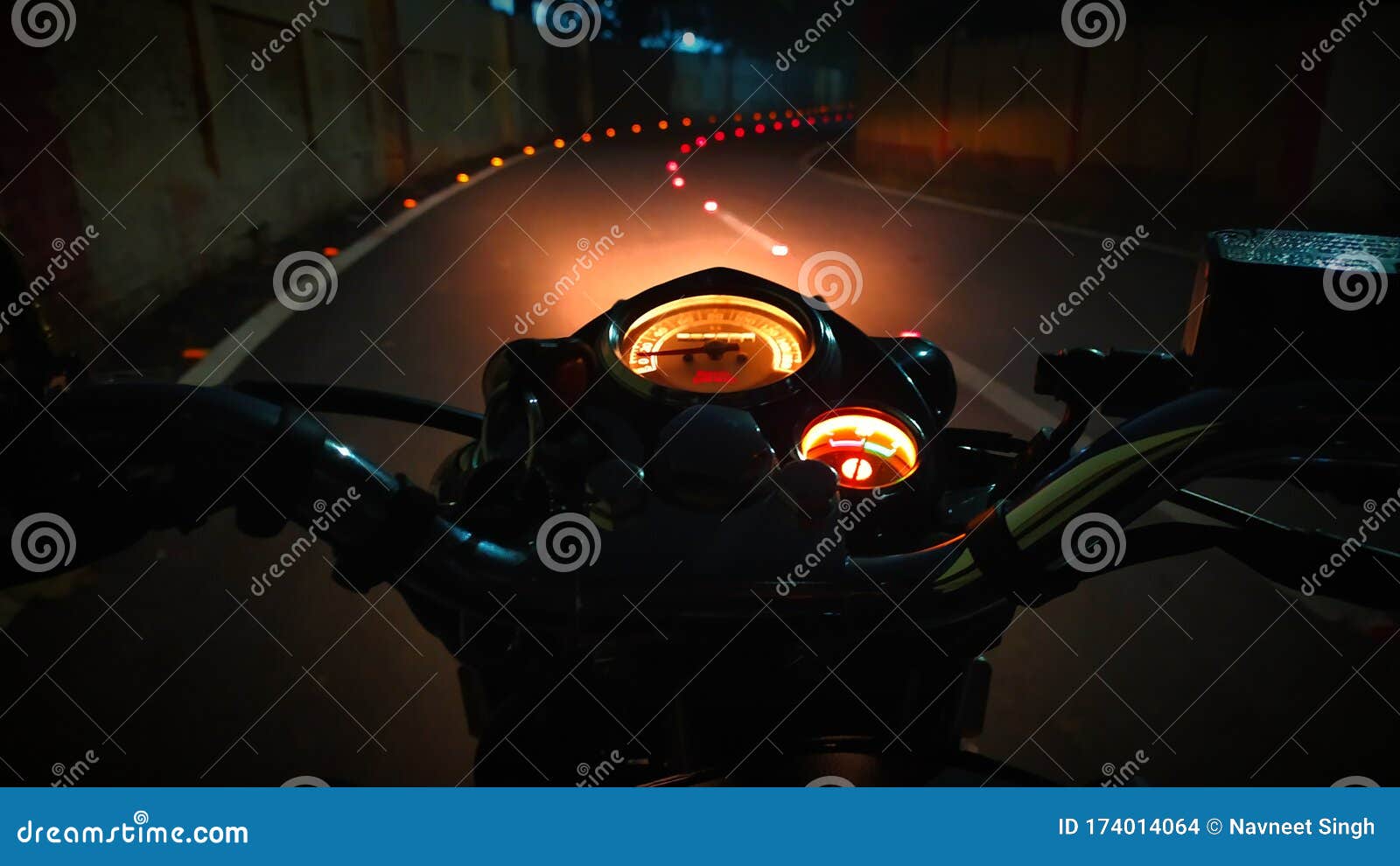 Bike Ride at Night on Road Divider Light Looking Beautiful Stock Photo ...