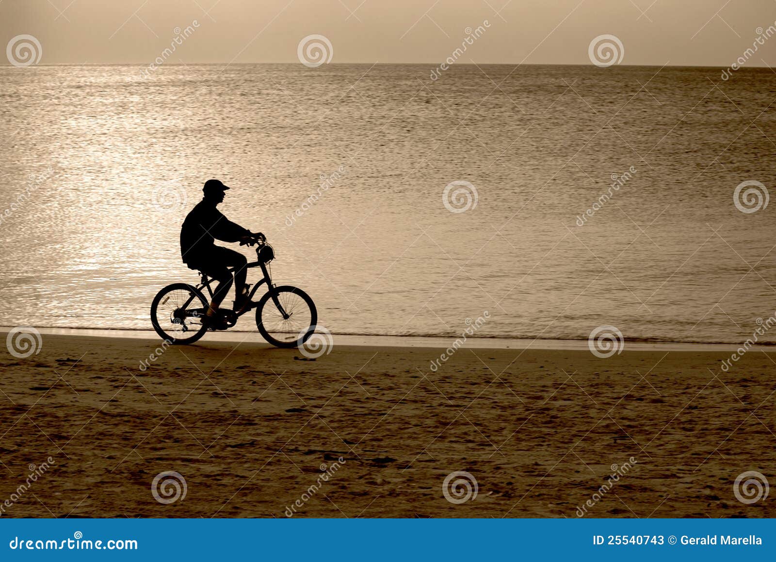 Bike riding on the beach stock image. Image of sand, bike - 25540743