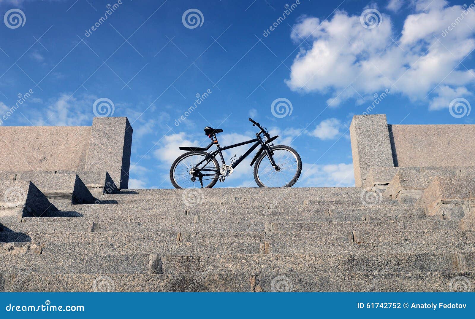 Bike Stands on the Stone Steps on the Background of Blue Sky and Stock ...