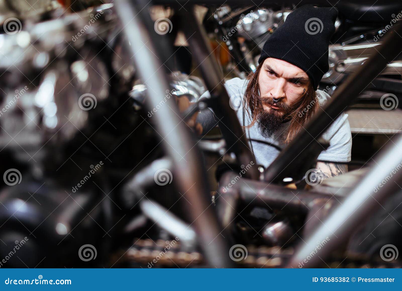 Biker Assembling Motorcycle in Garage Stock Photo - Image of moto ...