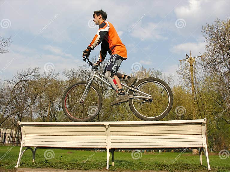 Biker on bench 2 stock image. Image of cycling, cyclist - 1705479